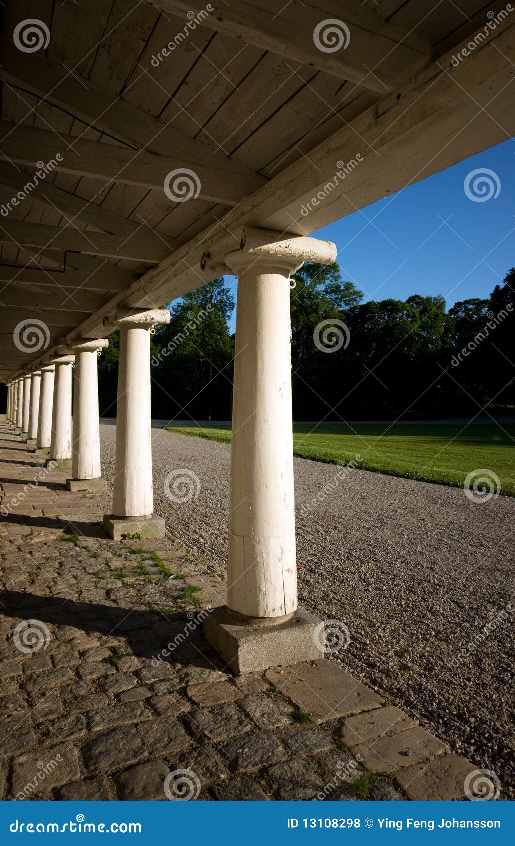 Row of wooden columns stock photo. Image of architectural - 13108298