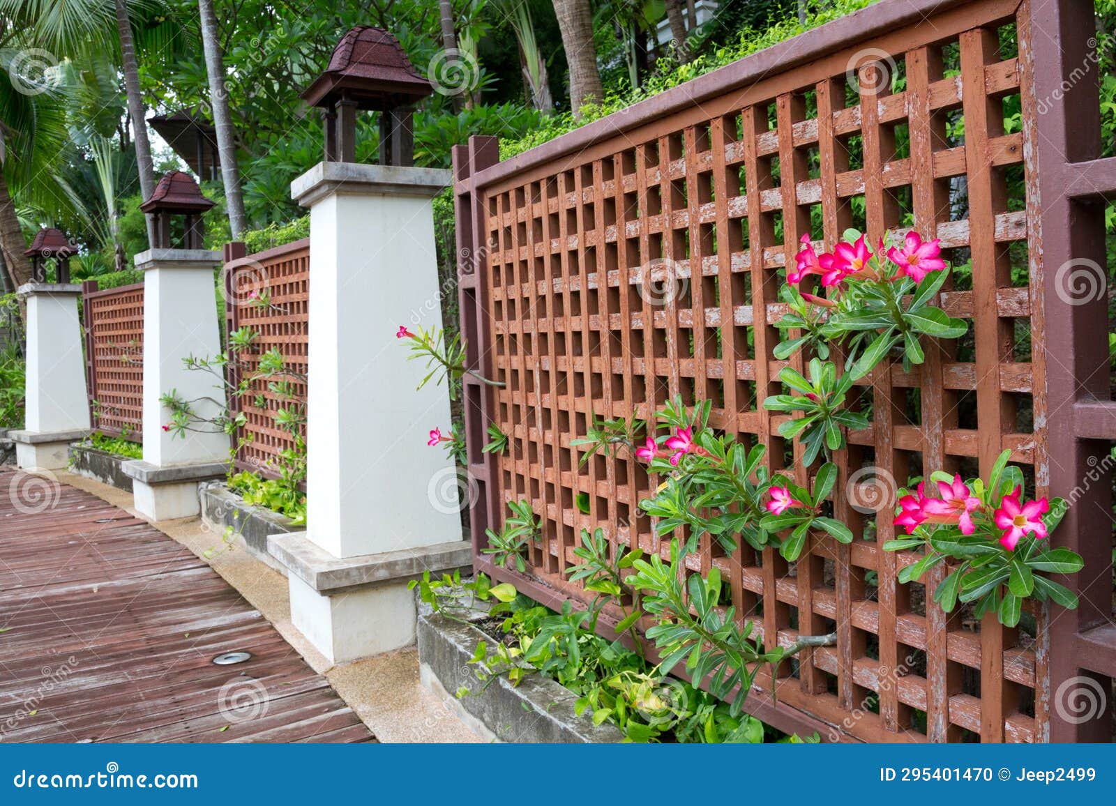 A row of wooden fences. stock photo. Image of exterior - 295401470
