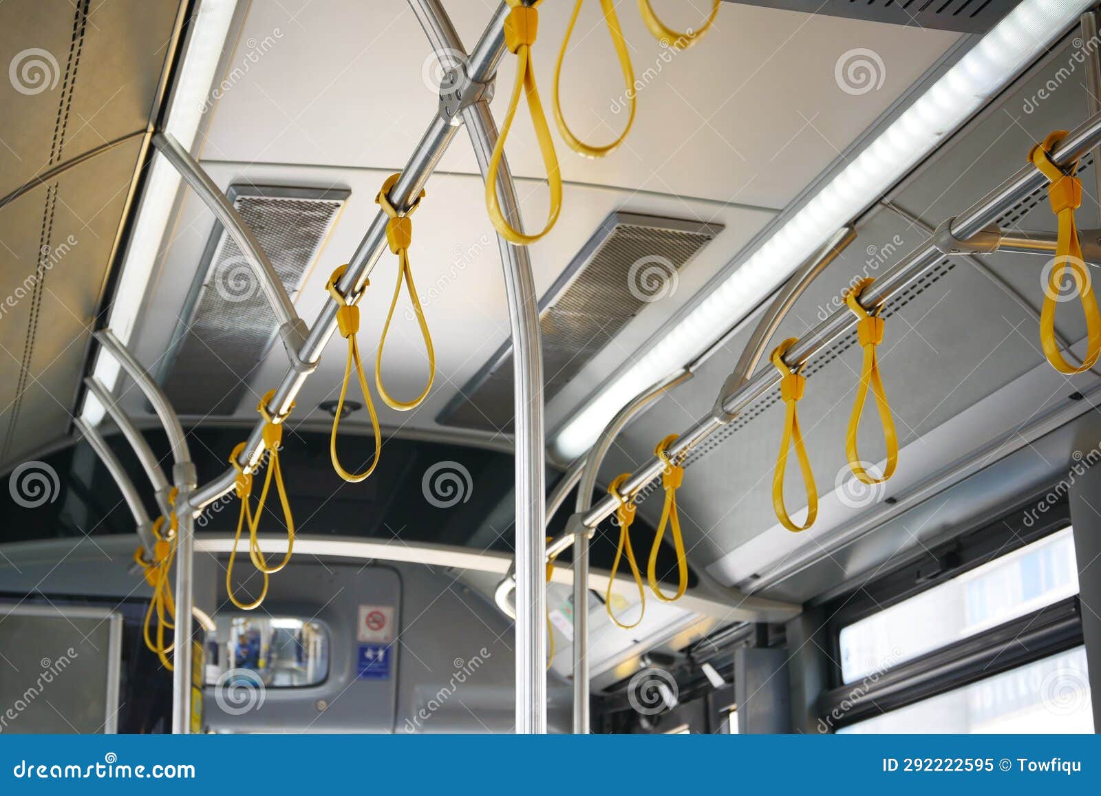 A Row of Yellow Handle on a Bus Stock Image - Image of morning, empty ...