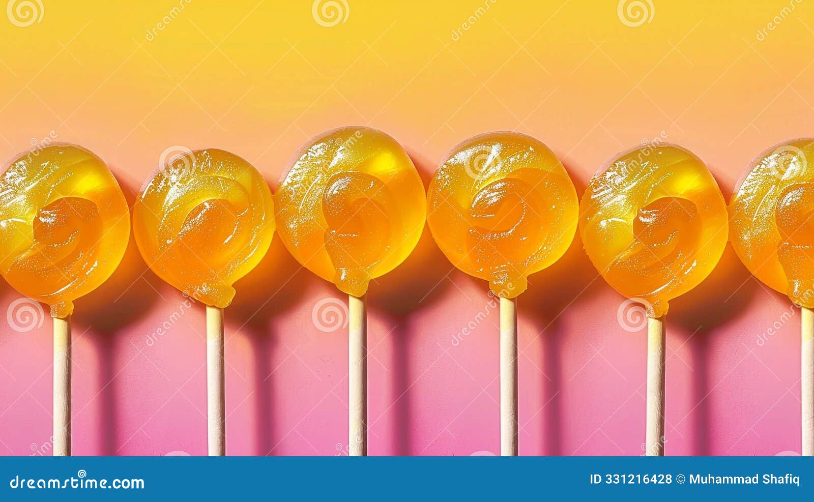 A Row of Yellow and Orange Lollipops on a Gradient Background Stock ...