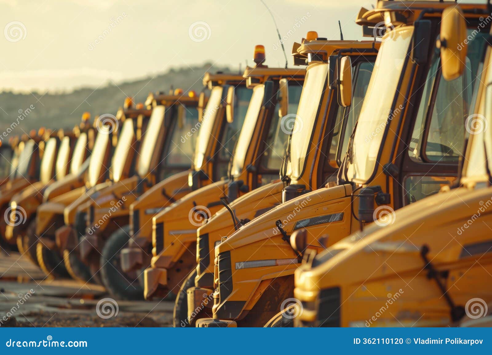 Row of Yellow School Buses Parked in a Lot, Suitable for Educational ...