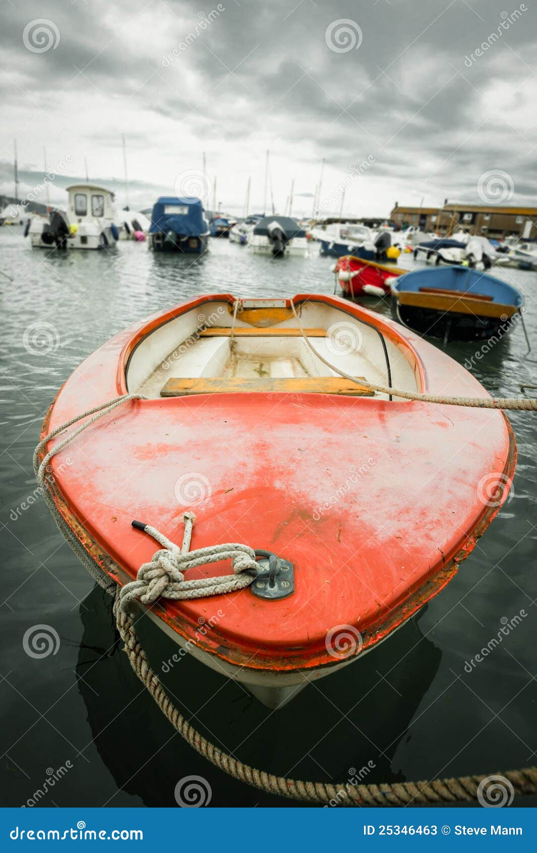 Rowboat stock image. Image of water, orange, small, canoe - 25346463