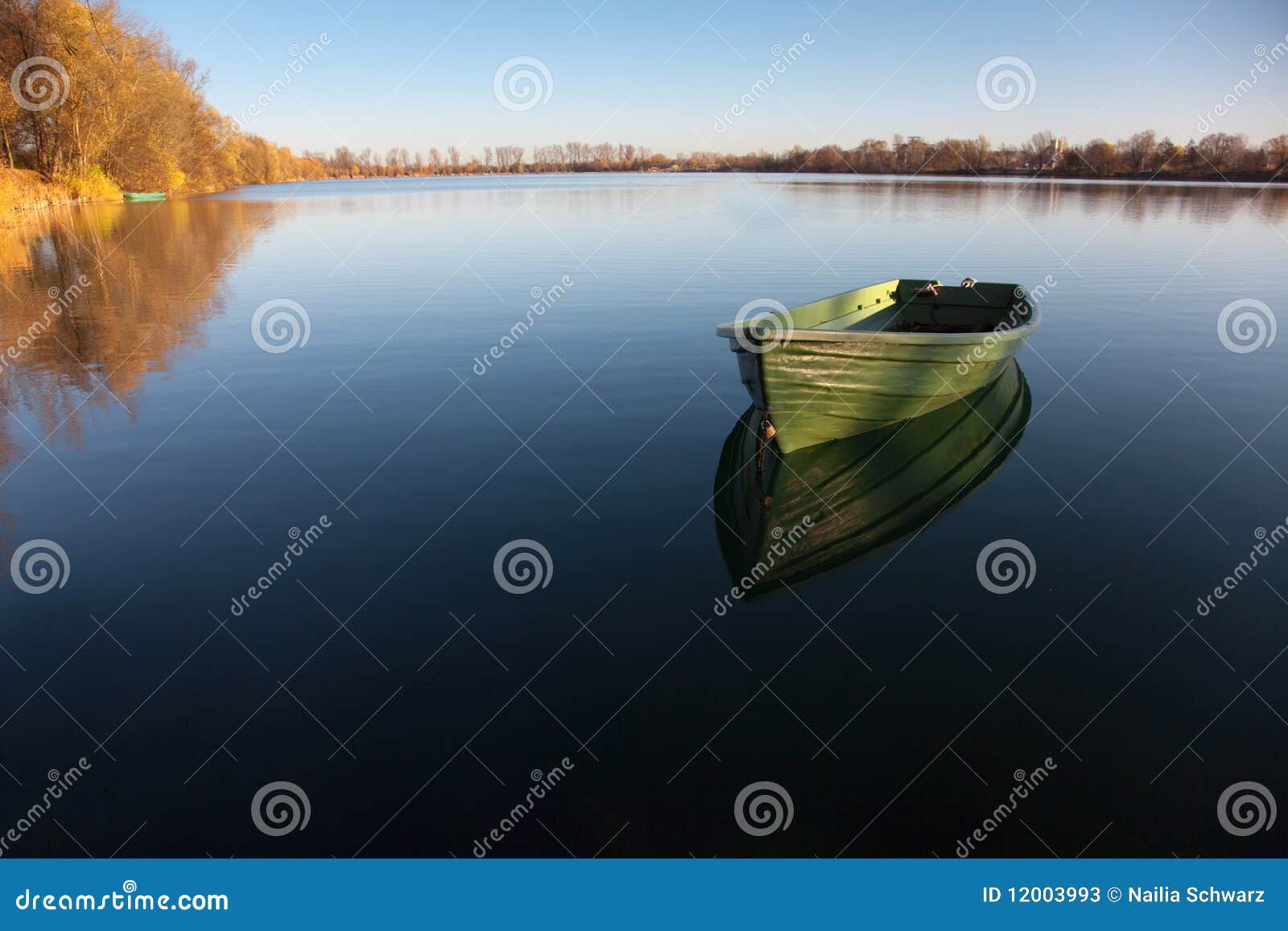 Rowboat on Lake stock image. Image of float, clear, pond - 12003993