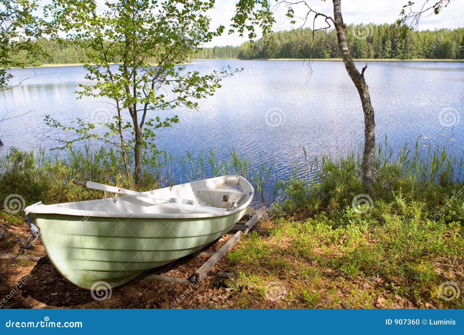 Rowboat stranded ashore stock photo. Image of rowing, summer - 907360