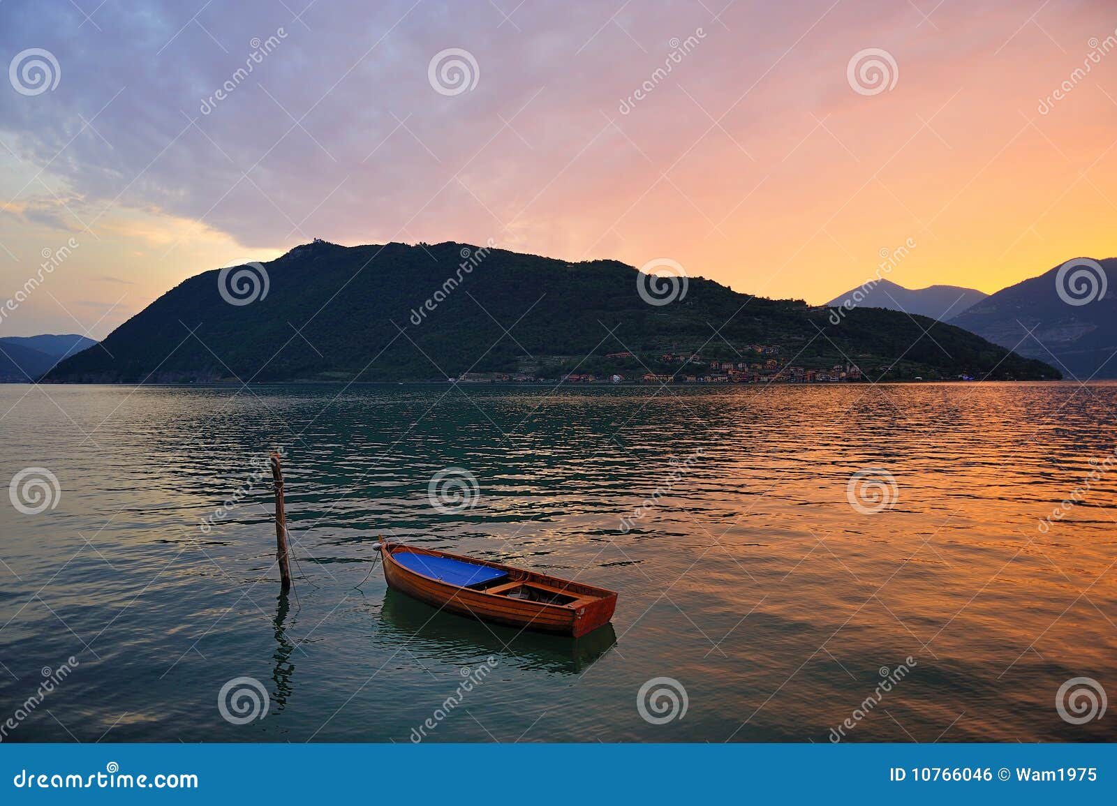 Rowboat and sunset stock photo. Image of life, coast - 10766046