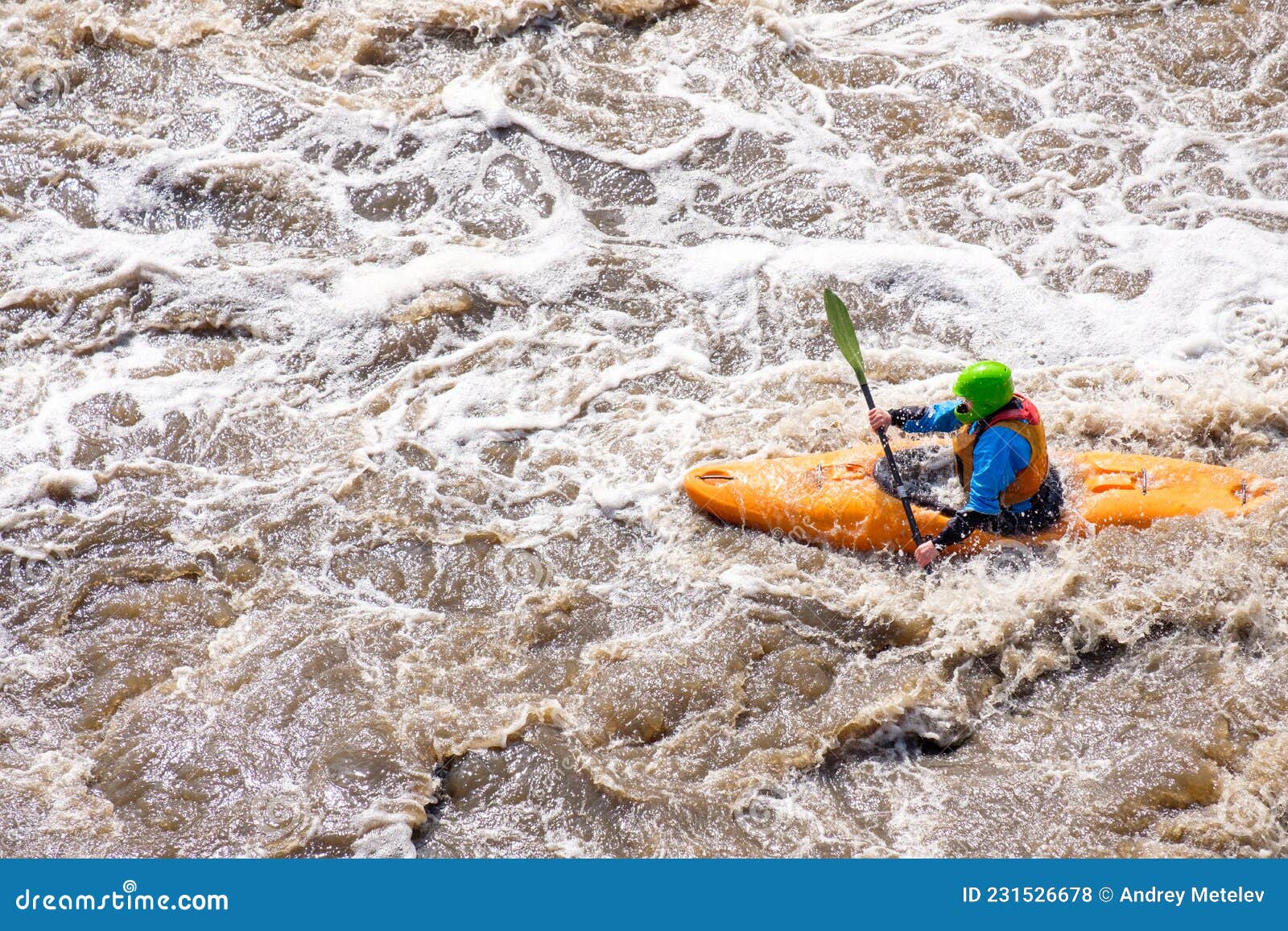 A Rower on a Kayak Goes Along a Mountain River. Dangerous Active Rest ...
