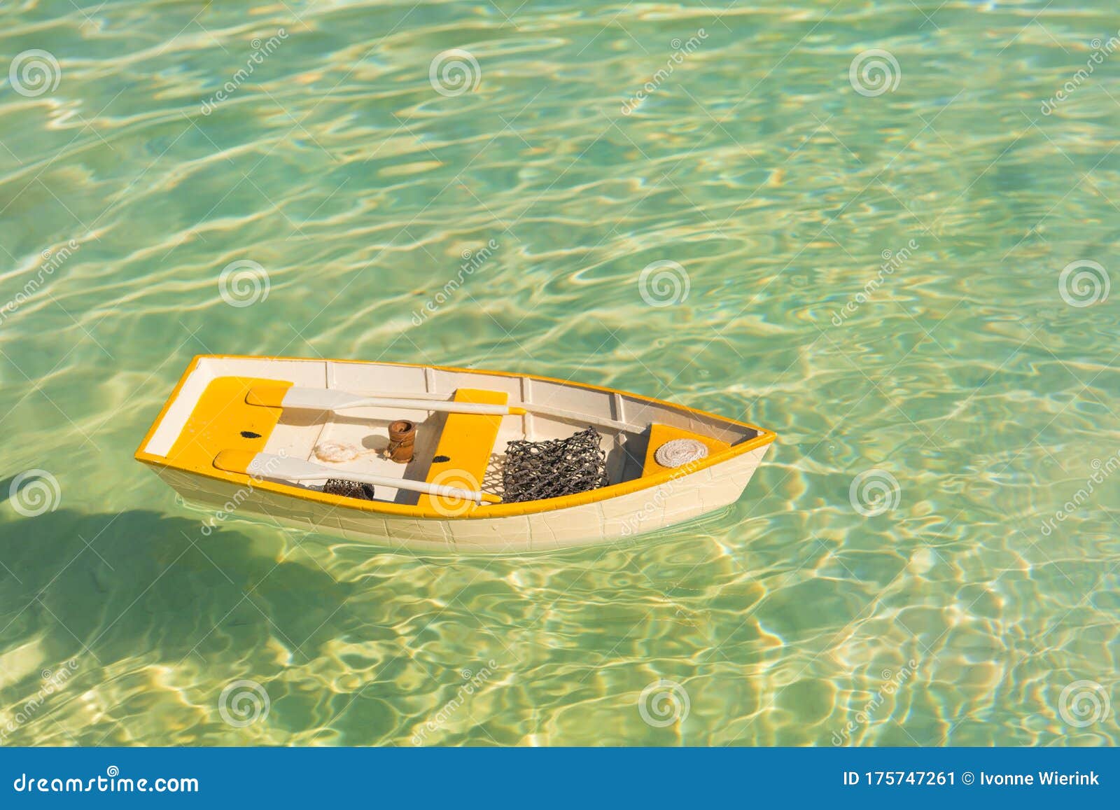 Rowing Boat Floating on Water Stock Image - Image of ocean, tranquility ...