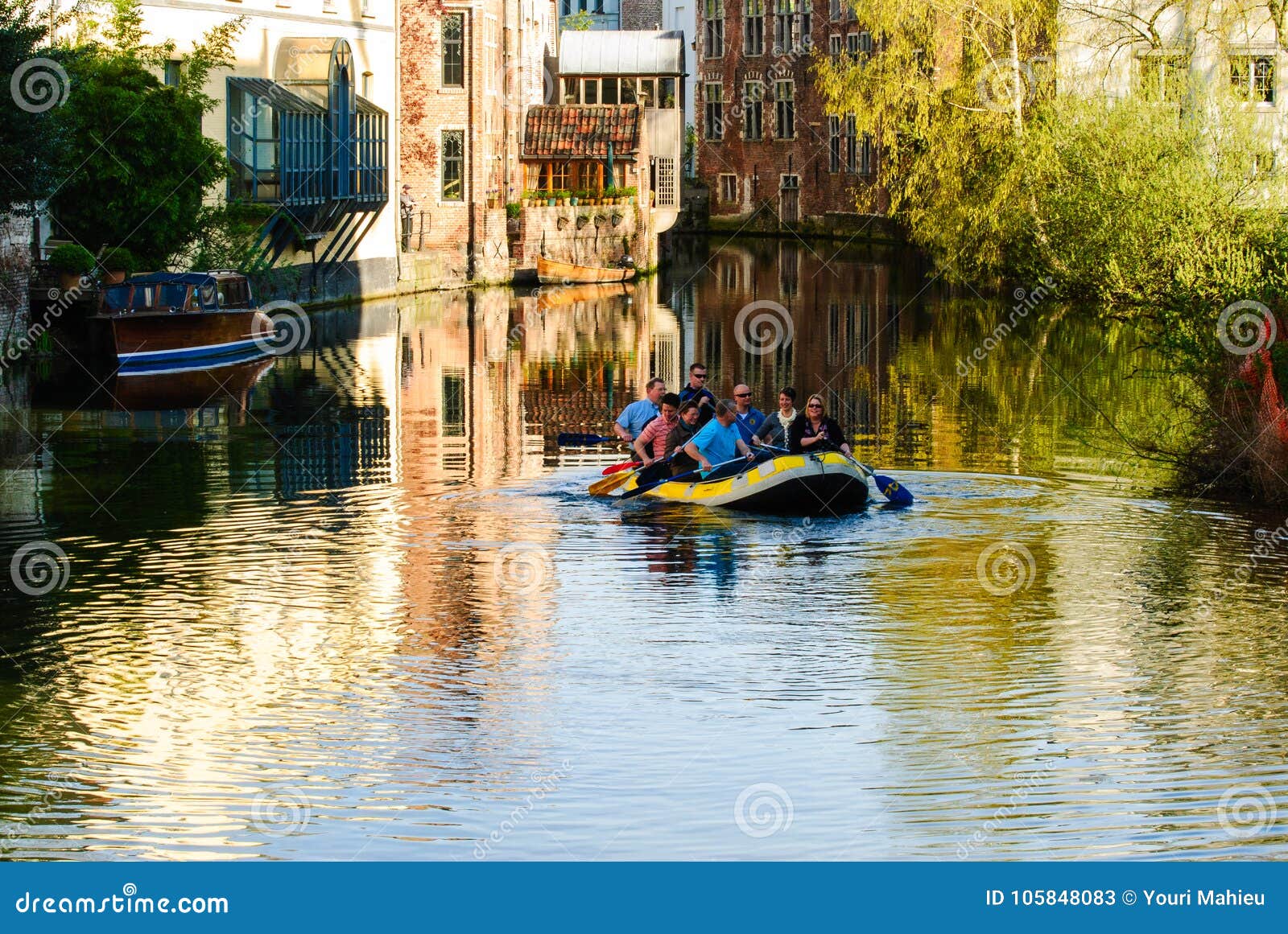 Rowing a boat in Gent editorial stock photo. Image of gentleman - 105848083