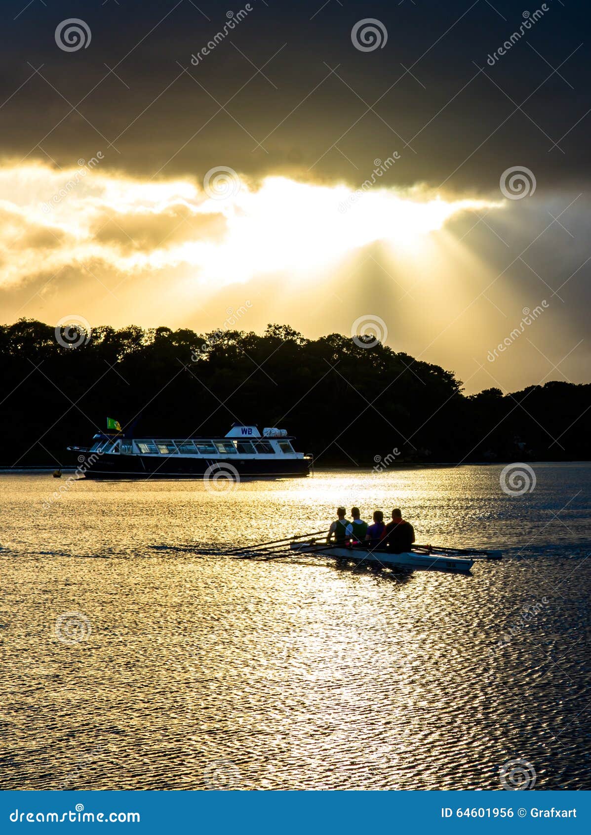 Rowing Boat on Sunset Lake stock photo. Image of fitness - 64601956