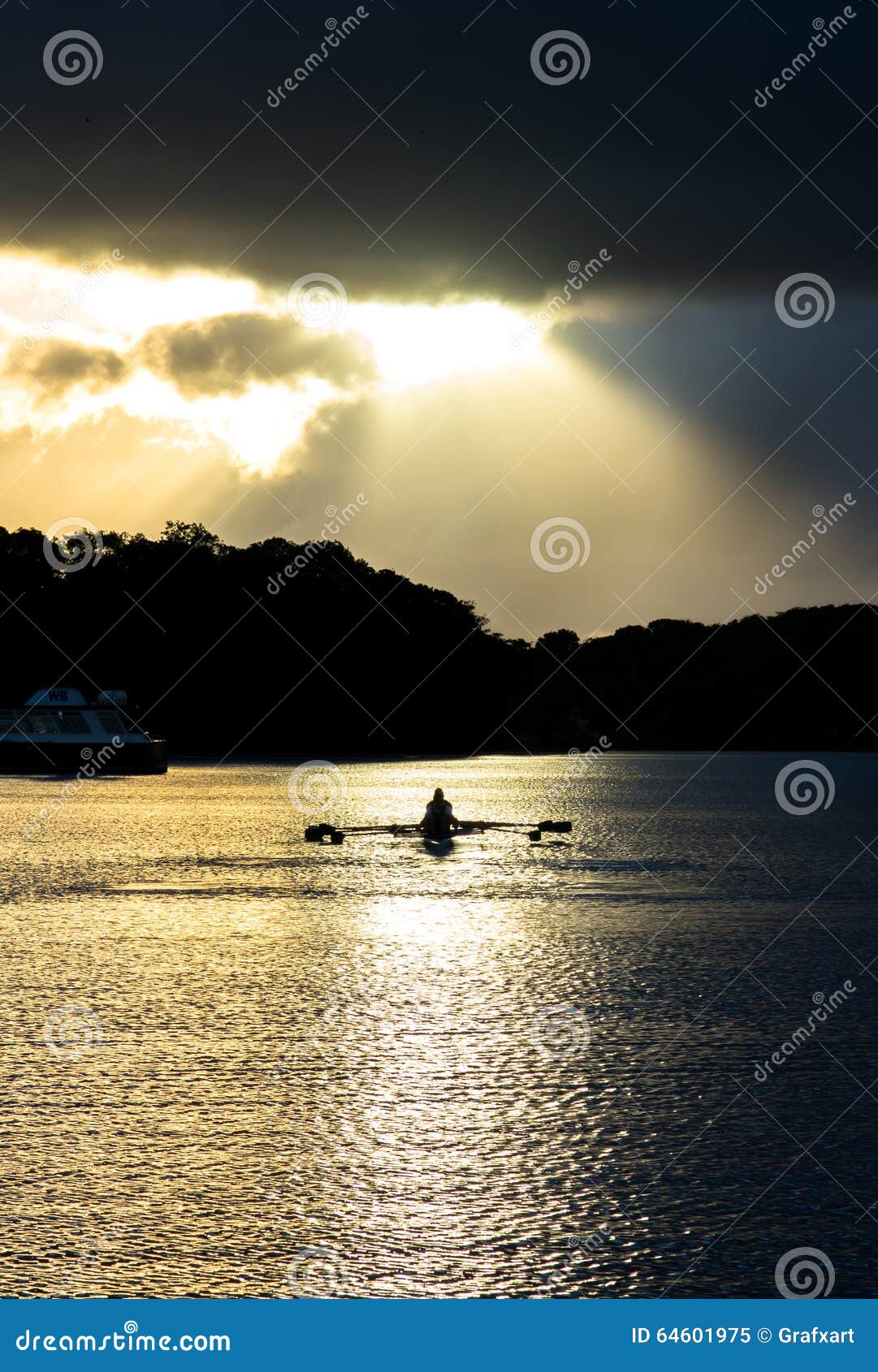 Rowing Boat on Sunset Lake stock image. Image of energy - 64601975