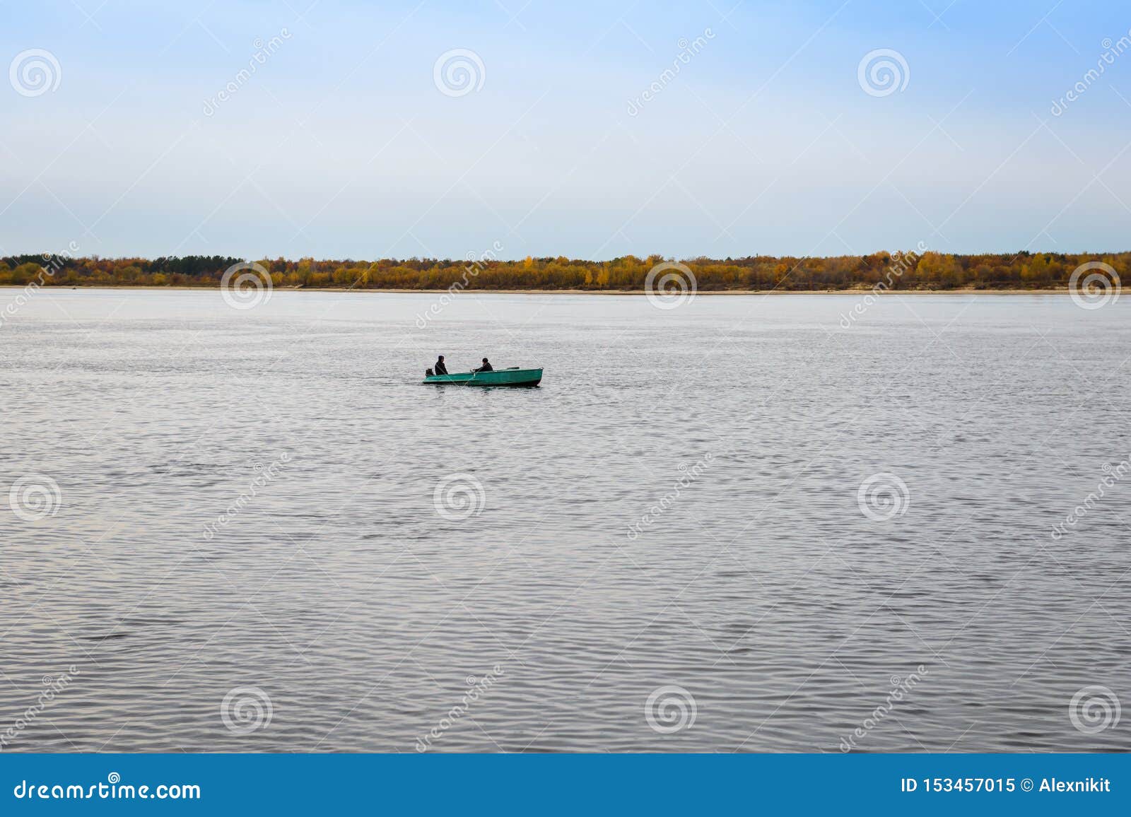 Rowing Boat with Two Men Sailing Along the River Editorial Image ...