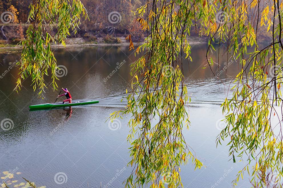 Rowing and Canoe Float Down the River in Autumn Stock Image - Image of ...