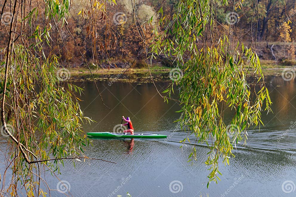 Rowing and Canoe Float Down the River in Autumn Stock Photo - Image of ...