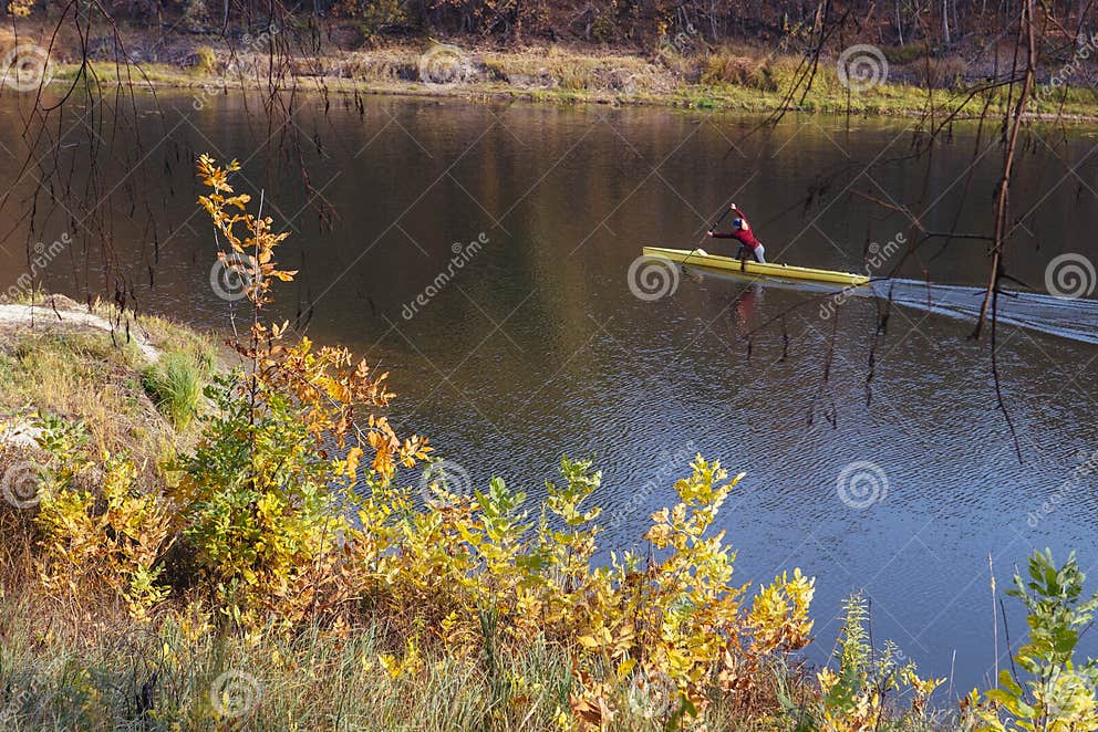 Rowing and Canoe Float Down the River in Autumn Stock Image - Image of ...