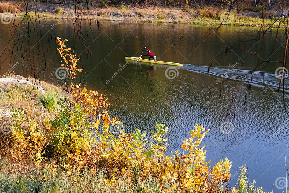 Rowing and Canoe Float Down the River in Autumn Stock Photo - Image of ...