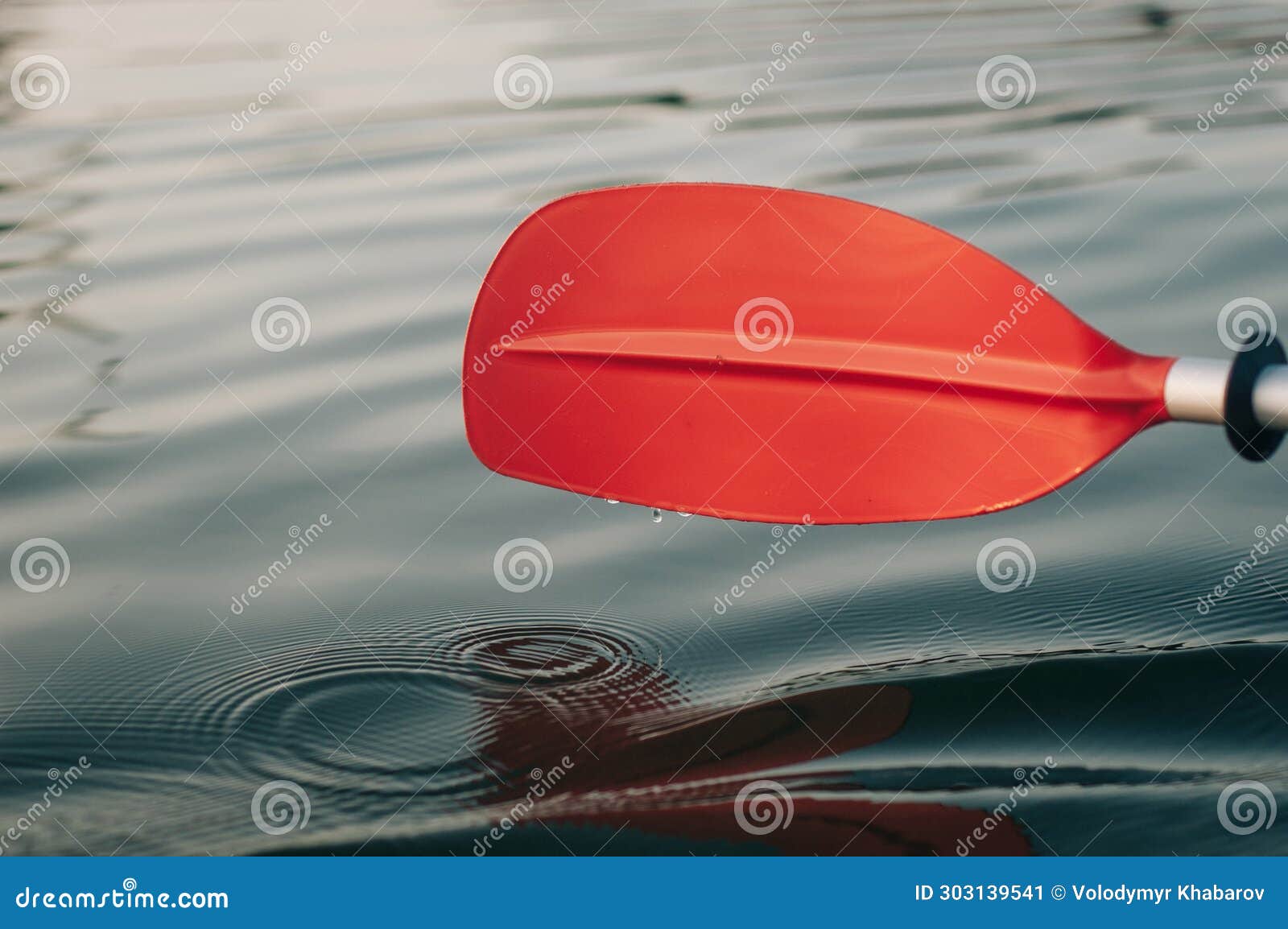 A Rowing Kayak Oar Above the Water Surface of the River Stock Image ...