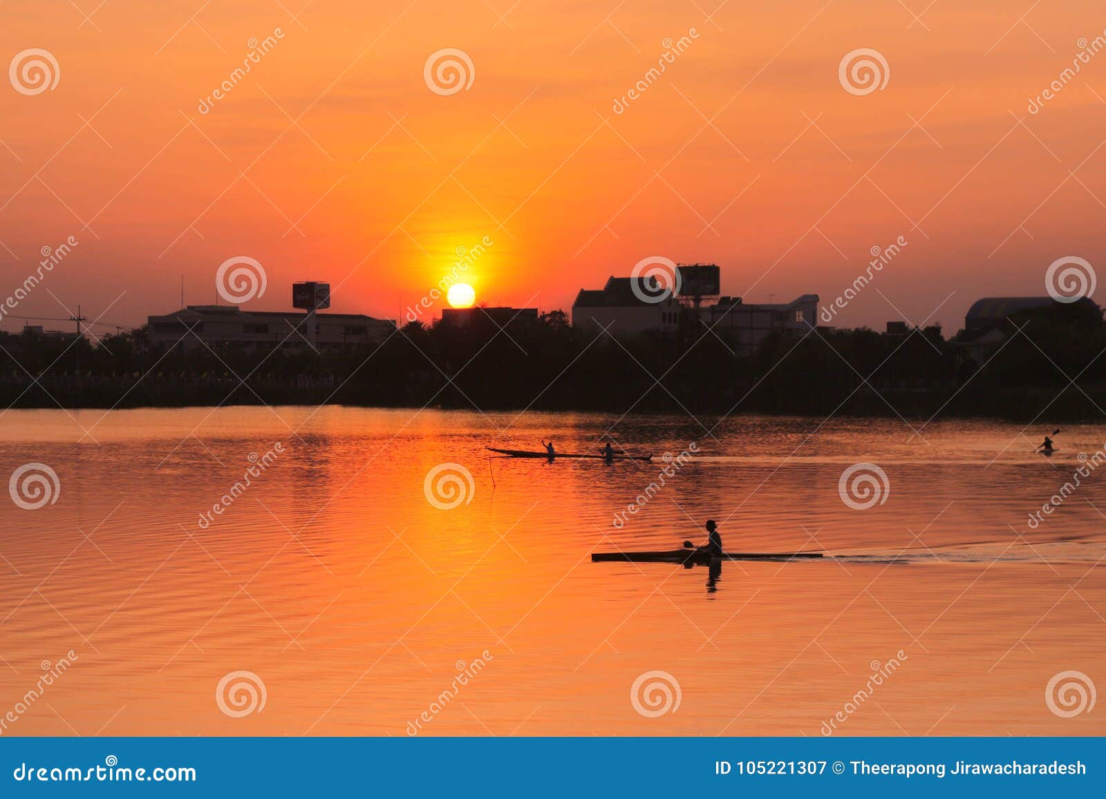 Rowing kayak in sunset stock image. Image of island - 105221307