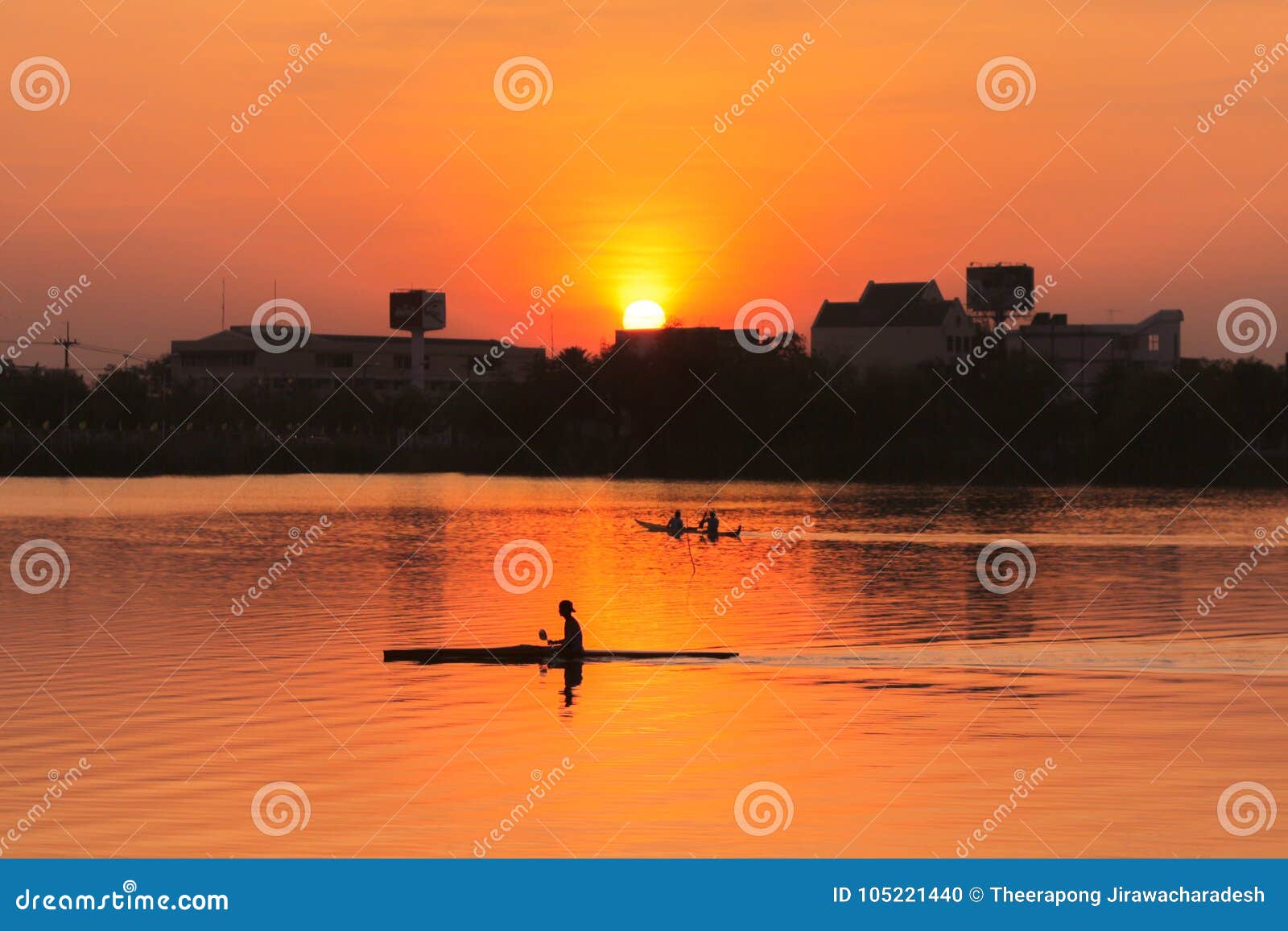 Rowing kayak in sunset stock photo. Image of canoe, river - 105221440