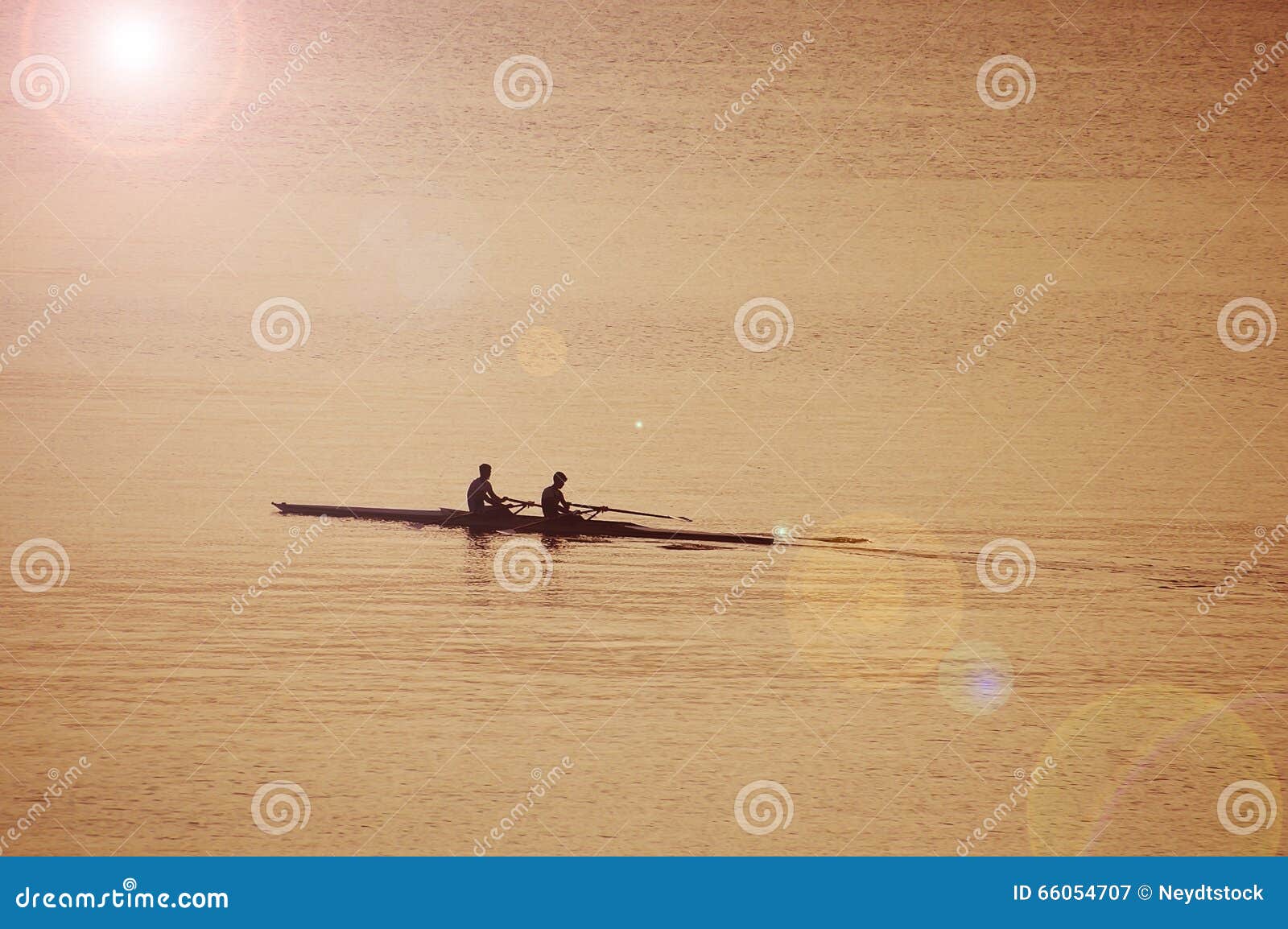 Rowing on the sea stock image. Image of training, water - 66054707