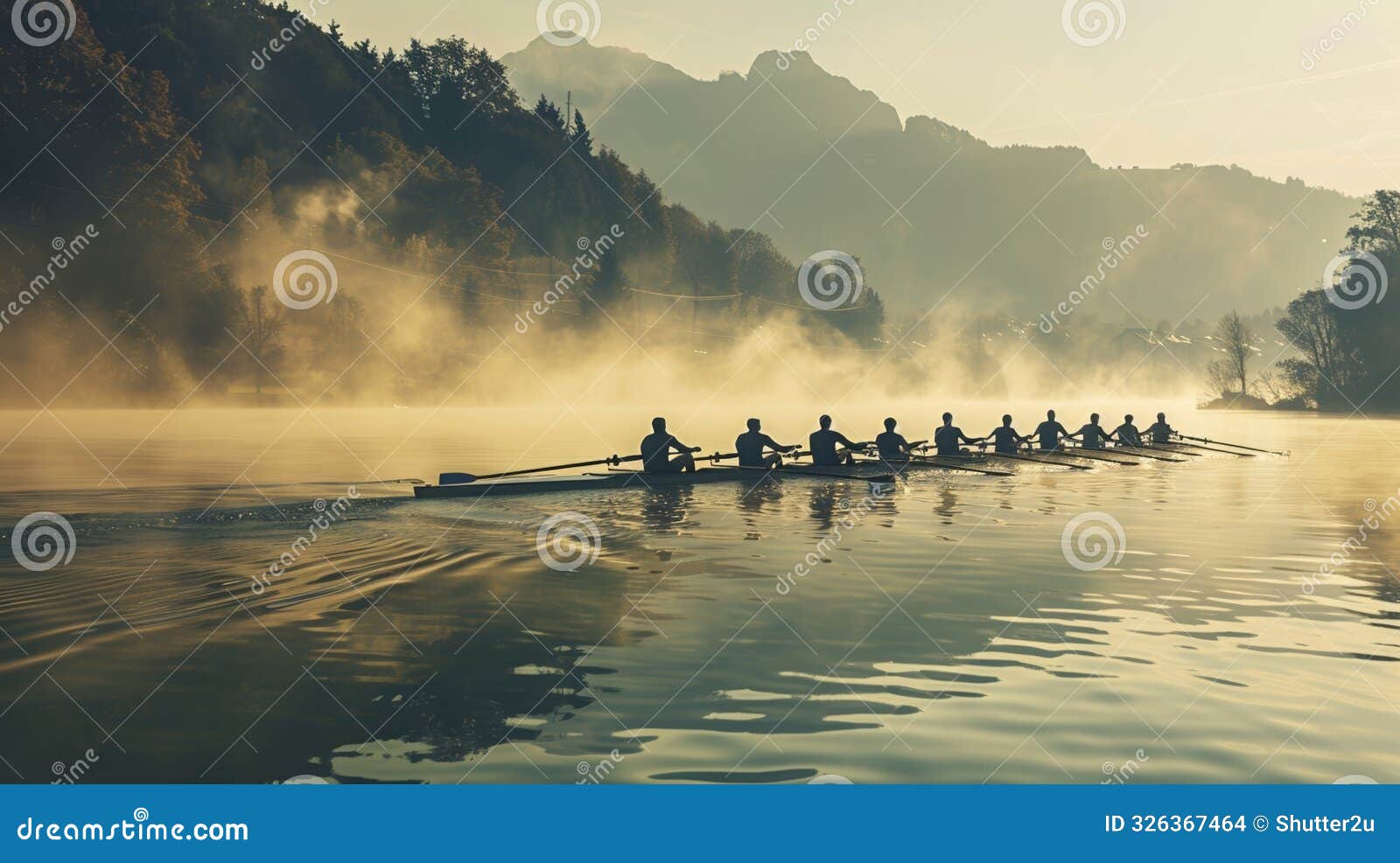A Rowing Team in Perfect Stroke Synchronization Early Morning Mist Over ...