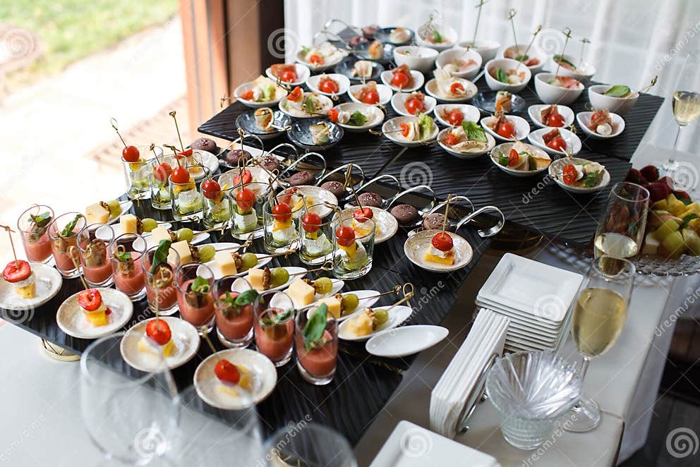 Rows of Appetizers and Starters on the Wedding Table Stock Photo ...