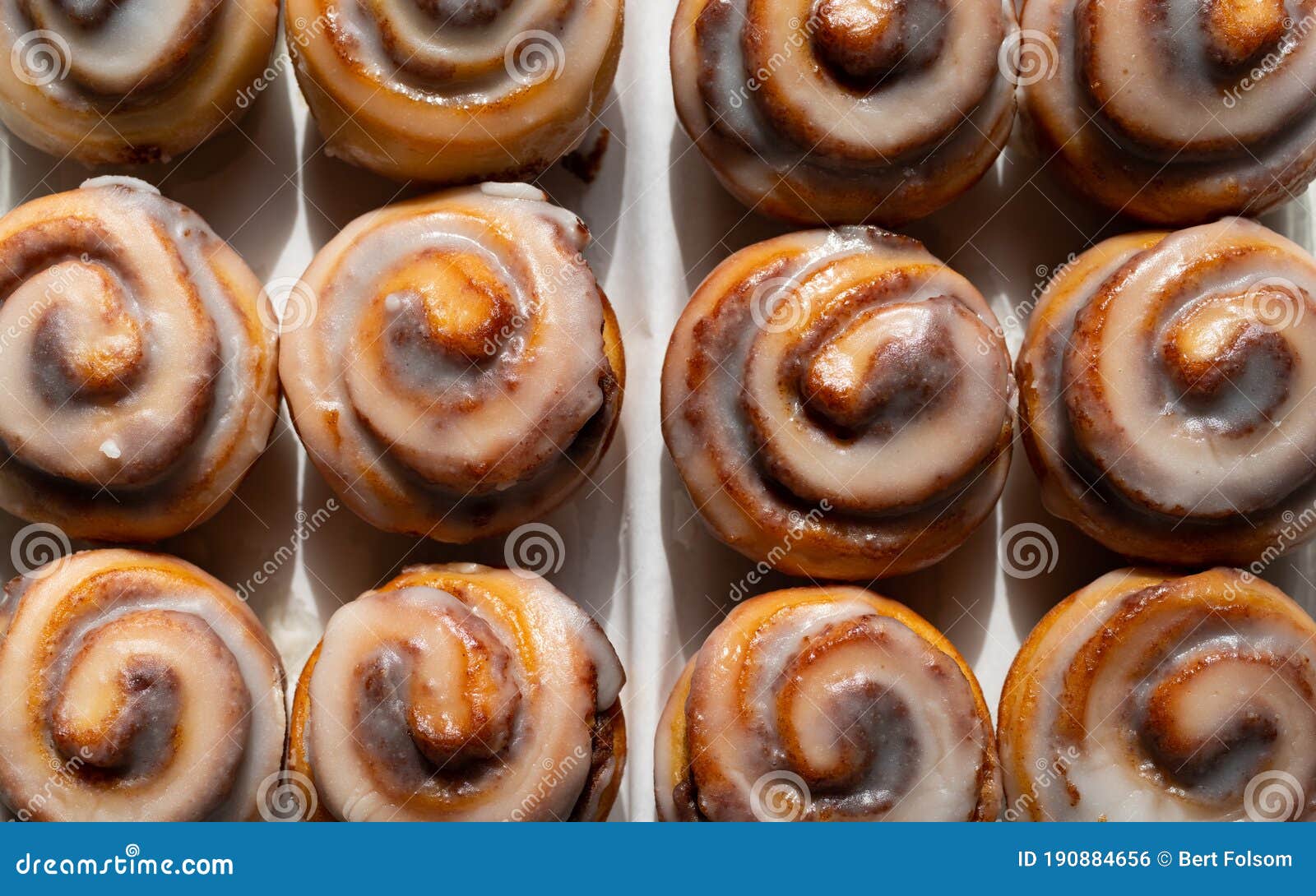 Rows of Bite Size Cinnamon Swirl Rolls in a Plastic Tray Stock Photo ...