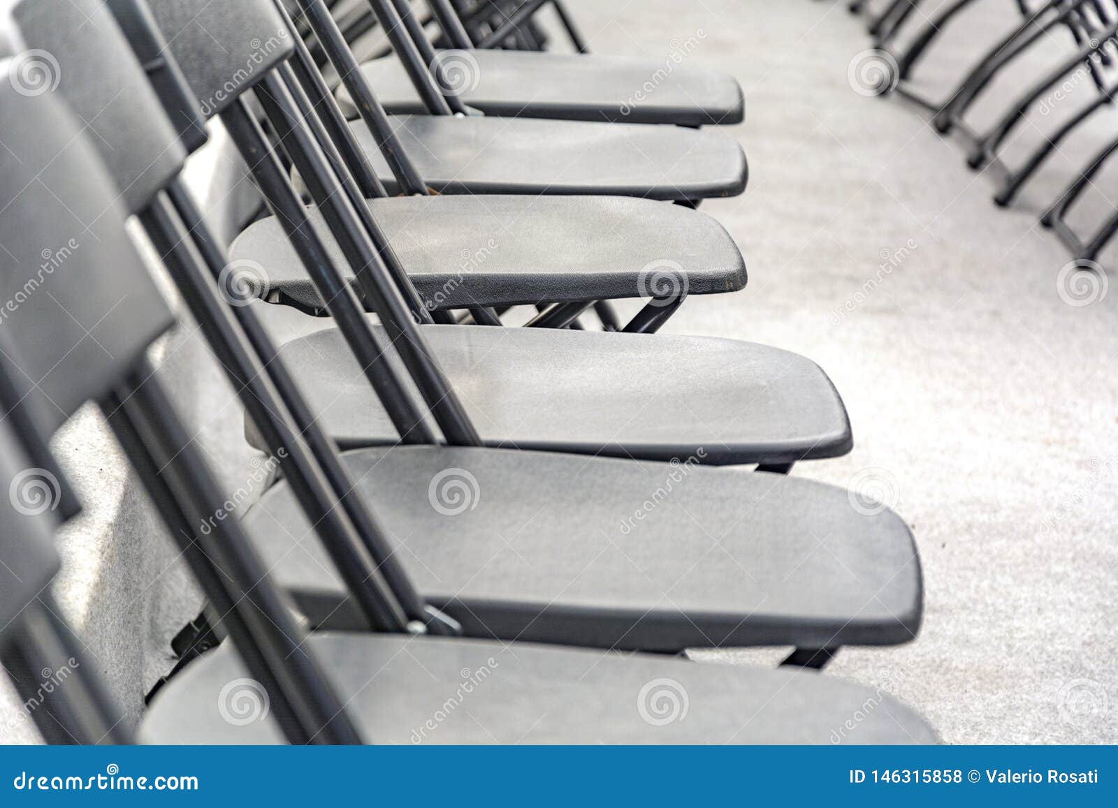 Rows of Black Folding Chairs Stock Photo - Image of auditorium, meeting ...