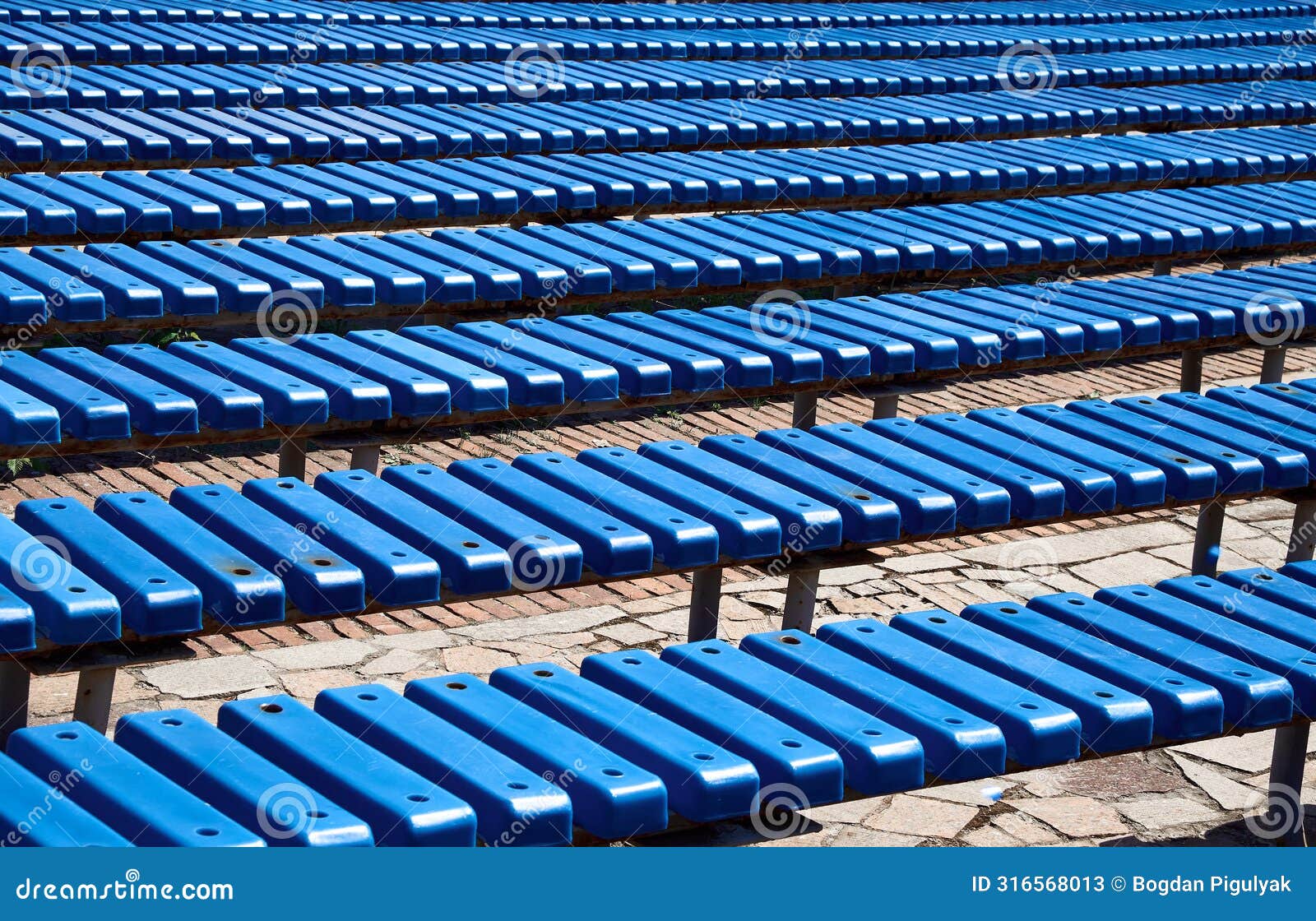 Rows of Blue Plastic Bleachers Waiting for the Audience Stock Image ...