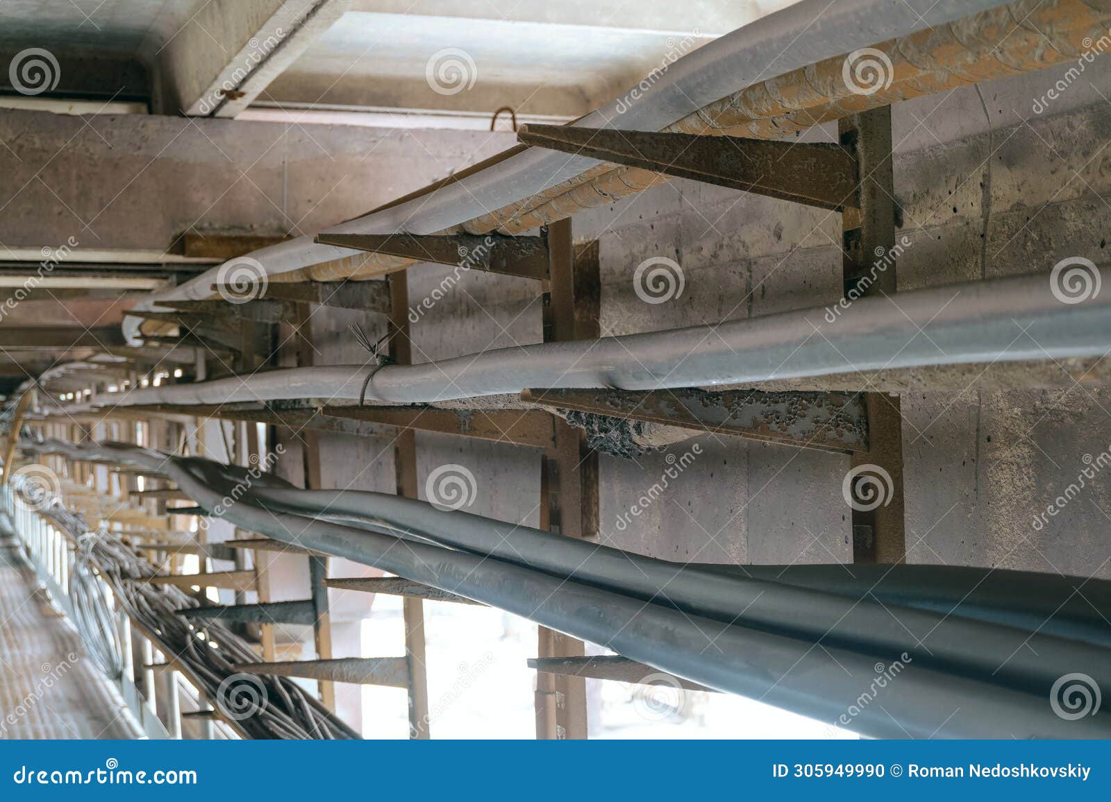 Rows of Cable on a Cable Overpass. Outdoors Industrial Conduit Corridor ...