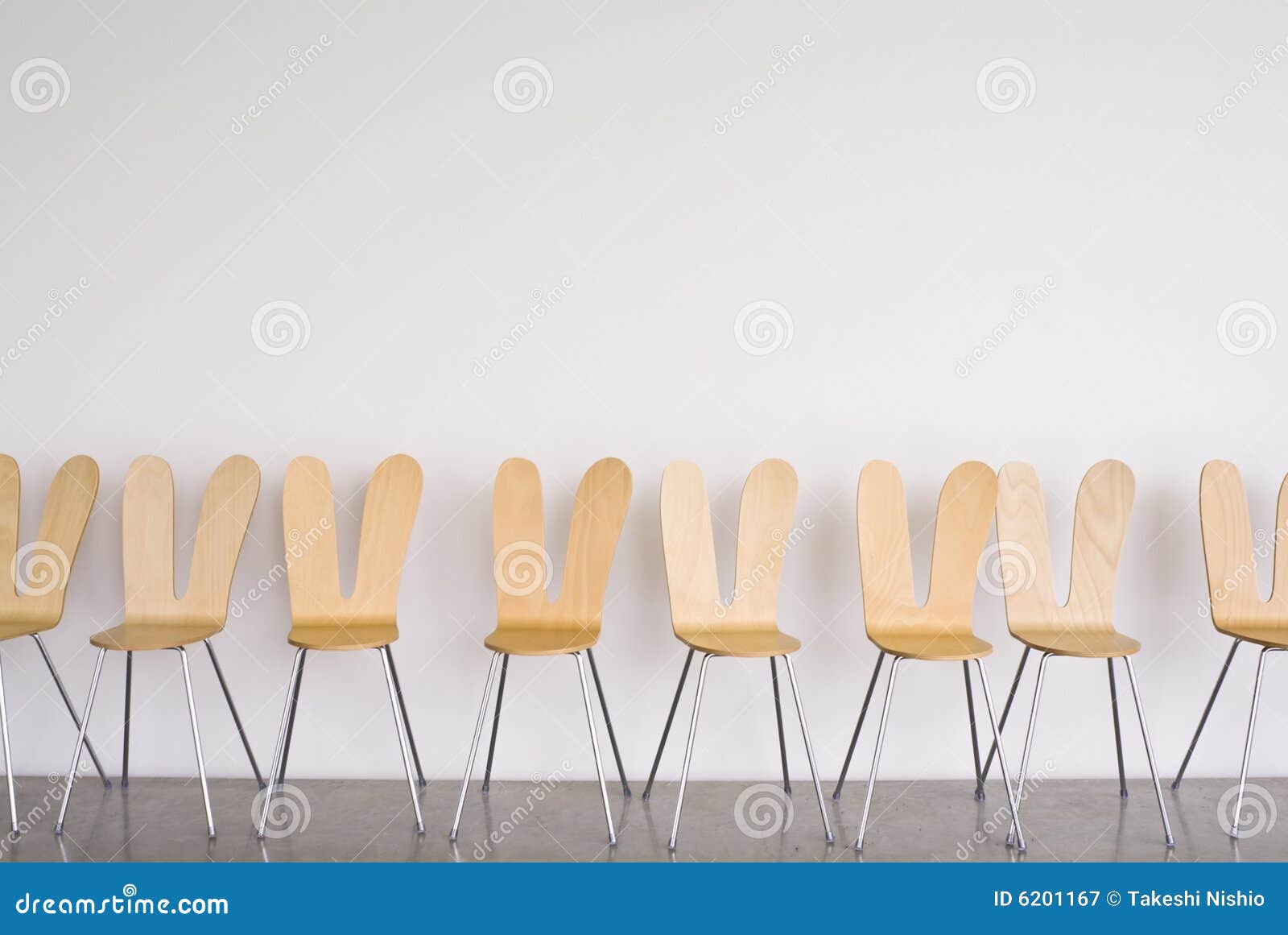 Rows of Chair Infront of Wall. Stock Image - Image of line, white: 6201167