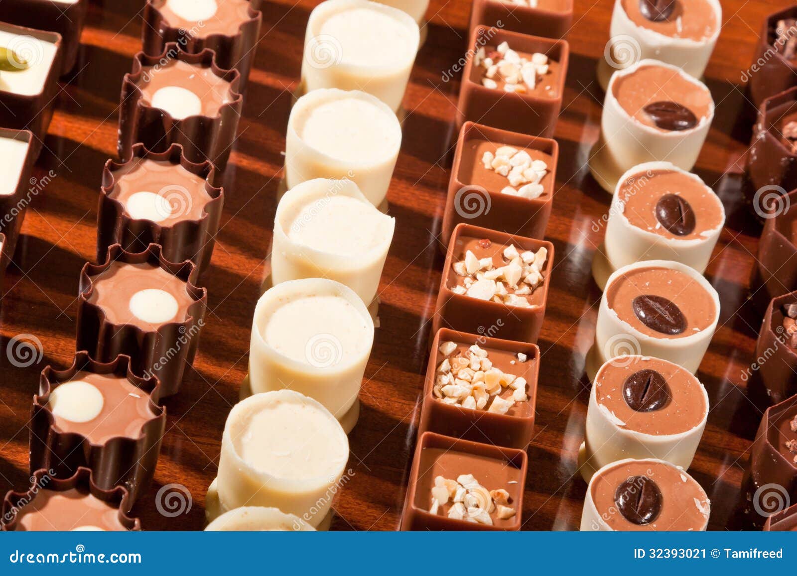 Rows of Chocolates stock image. Image of enjoy, sugar - 32393021