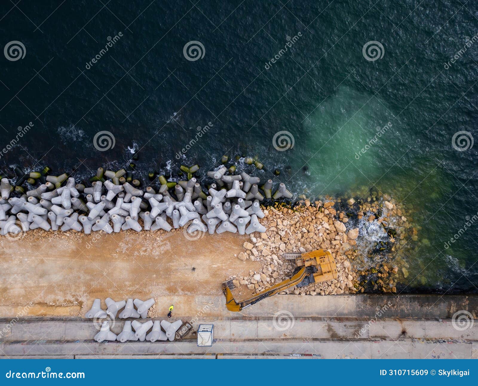 Rows of Concrete Blocks Along Beach Stock Image - Image of defense ...