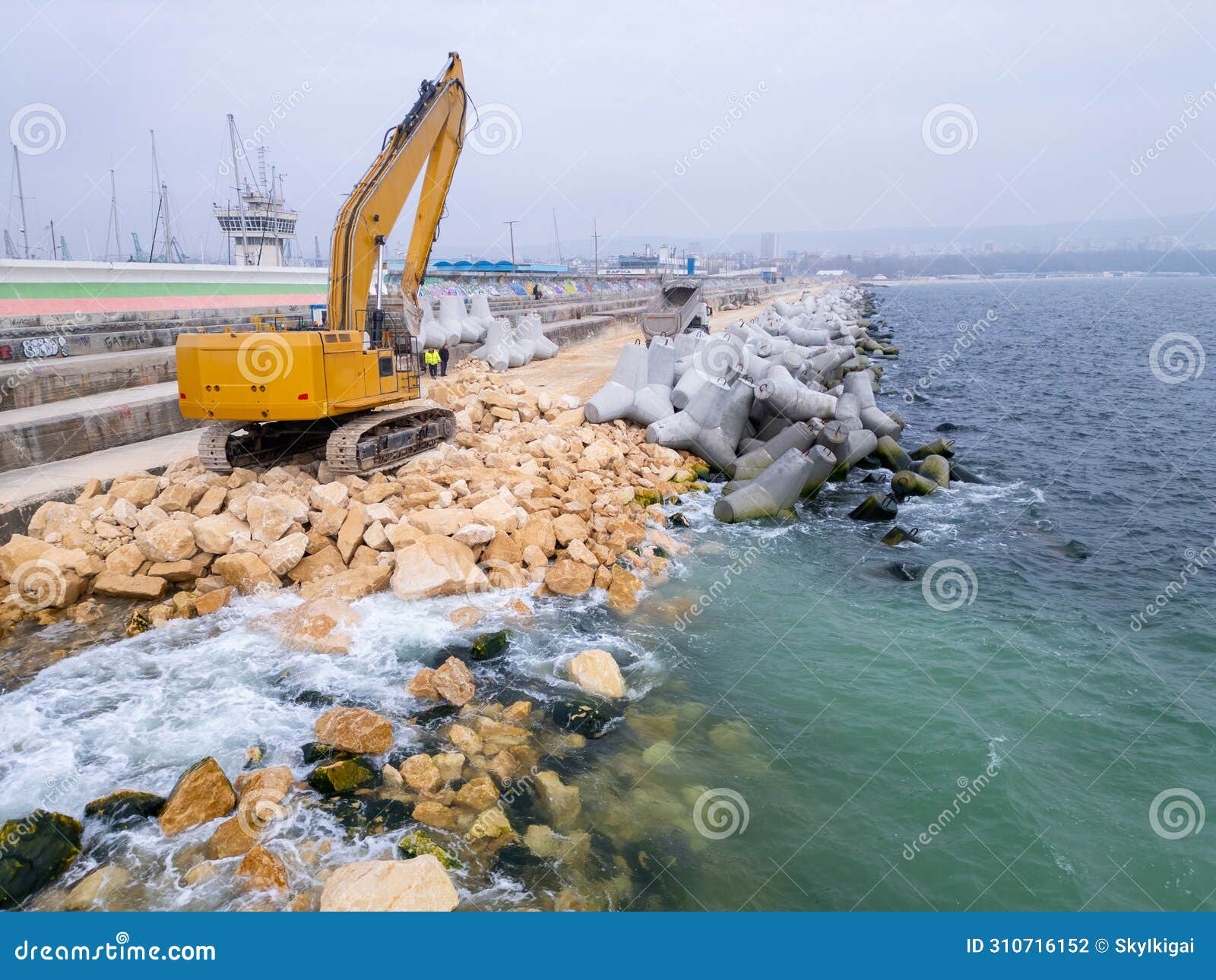 Rows of Concrete Blocks Along Beach Stock Photo - Image of construction ...