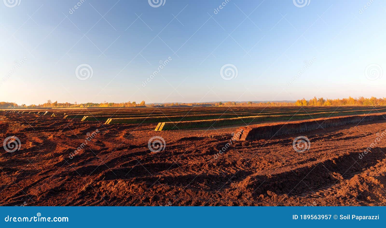 Rows of Cutted Peat in Northwestern Germany Stock Image - Image of blue ...