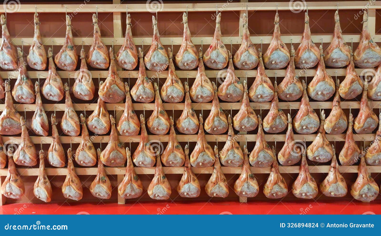 Rows of Delicious Prosciutto Hanging and Curing in a Traditional Way ...