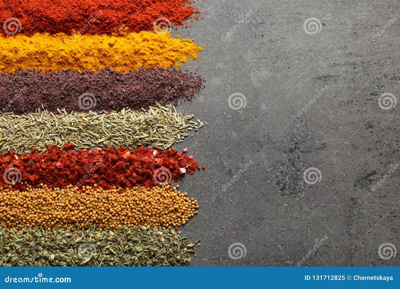 Rows of Different Aromatic Spices on Gray Background Stock Image ...