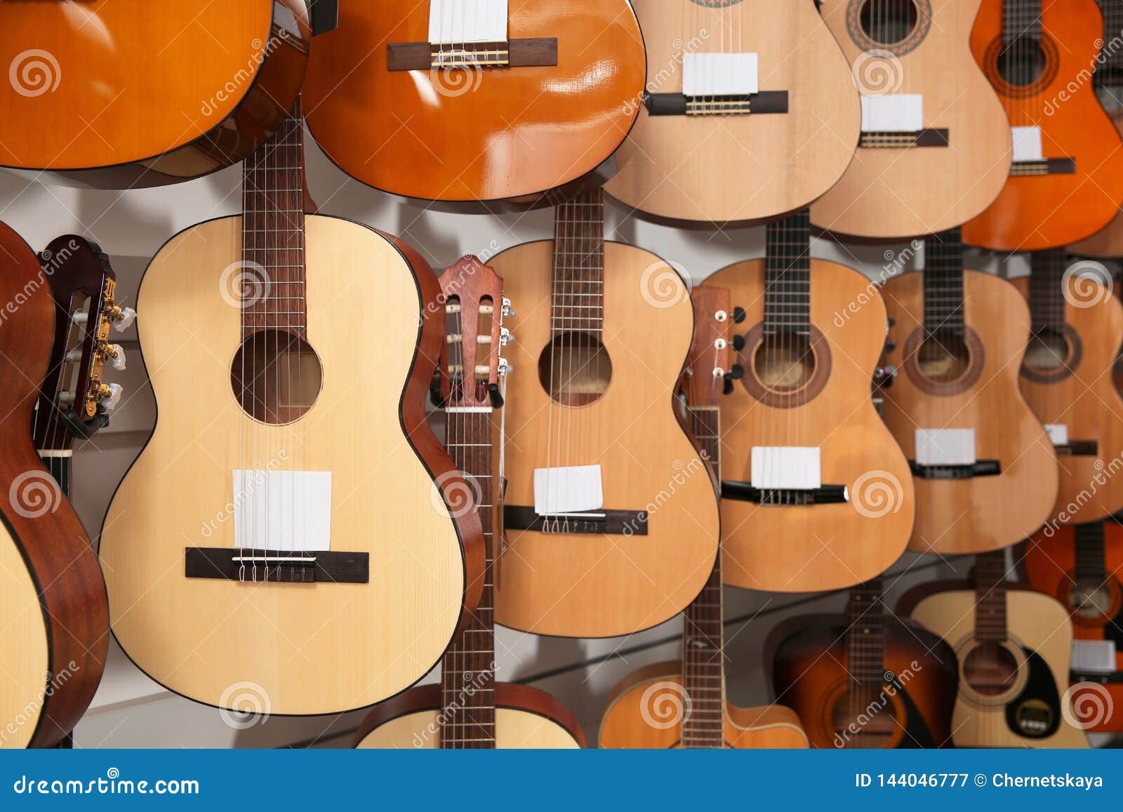Rows of Different Guitars in Store Stock Image - Image of guitar, sale ...