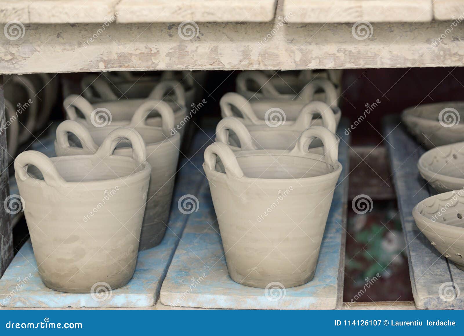 Rows of Drying Pottery stock image. Image of clay, mold - 114126107