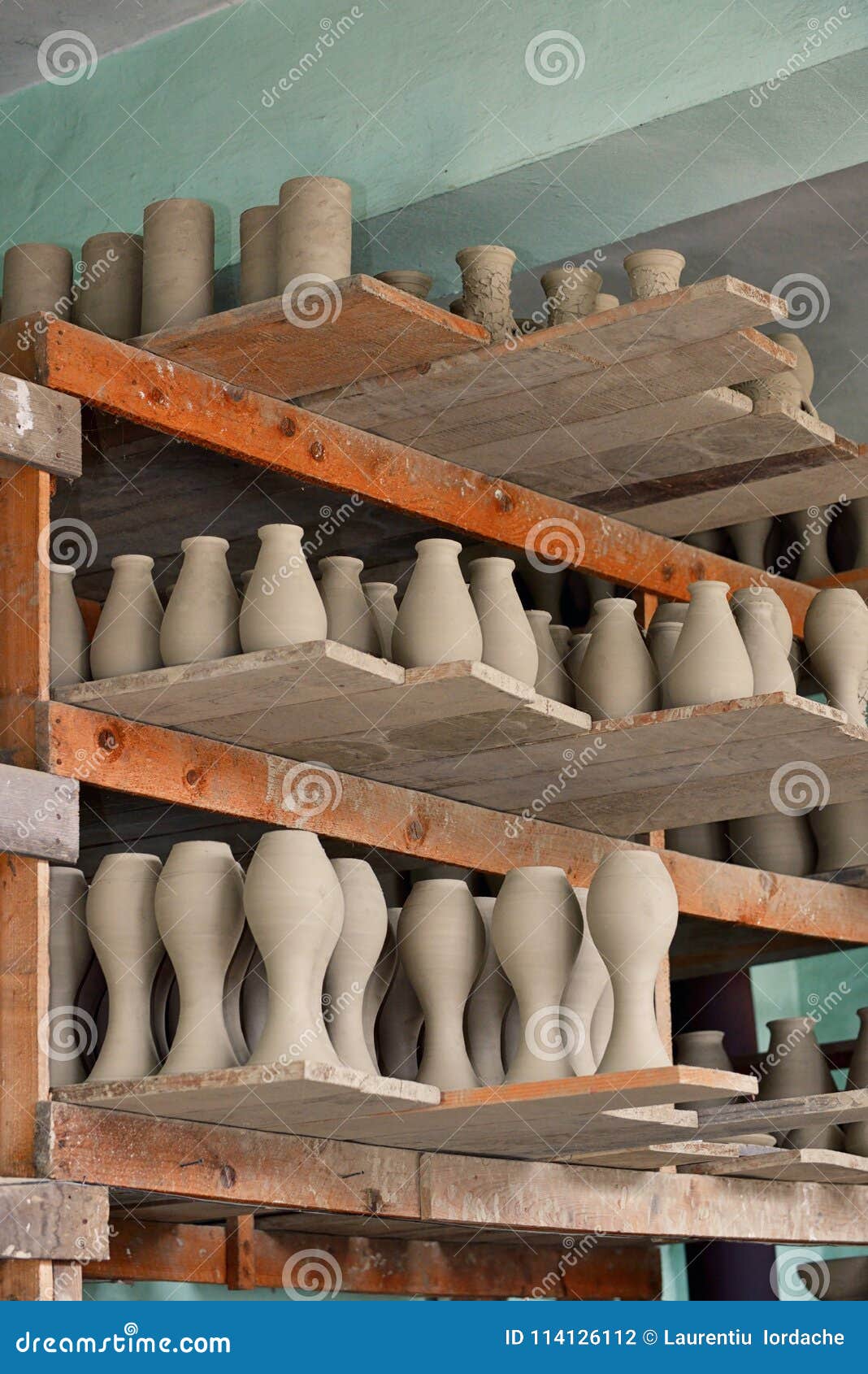 Rows of Drying Pottery stock photo. Image of argil, jars - 114126112