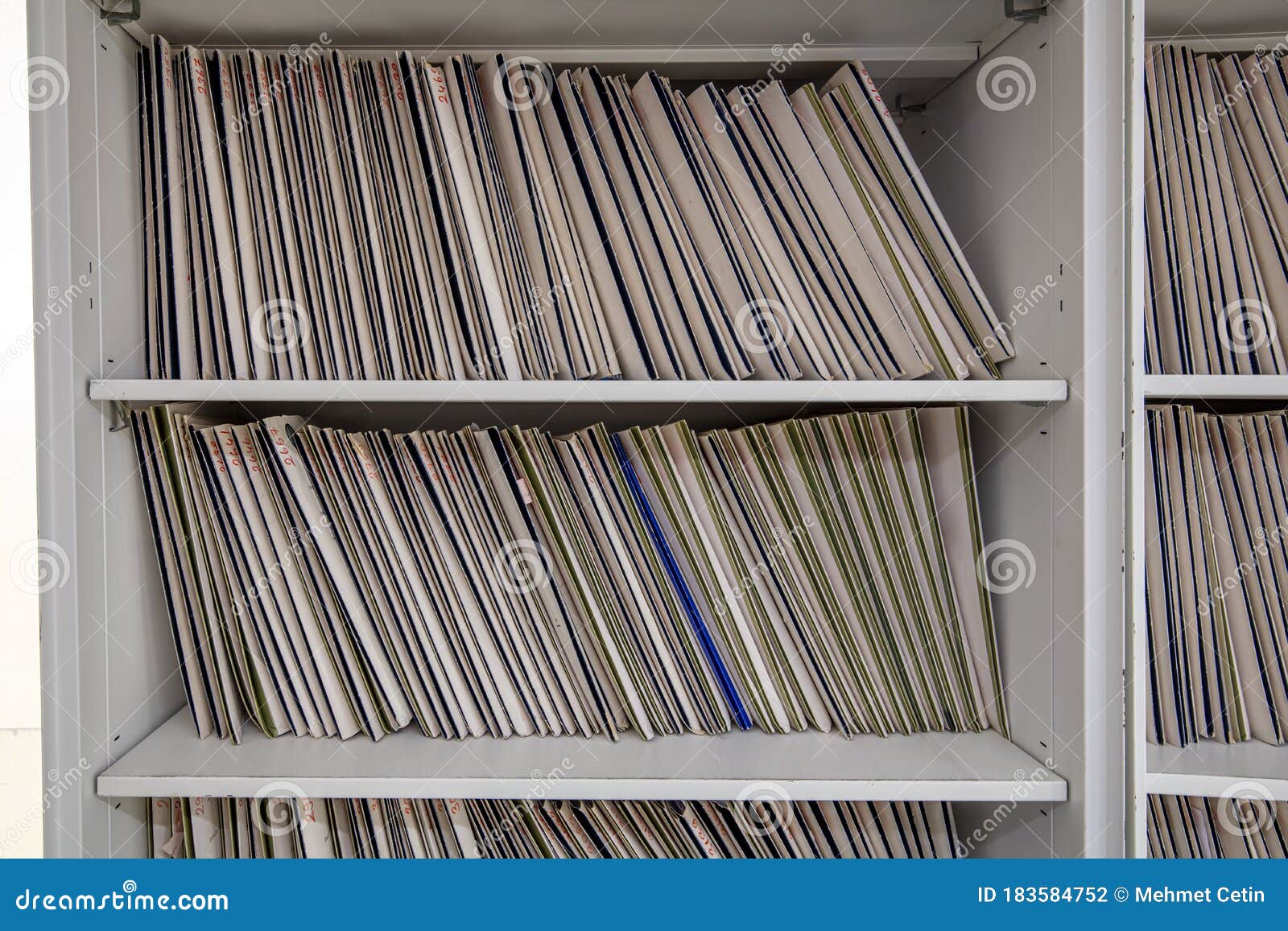 Rows of File Folders Arranged on Shelf with Client Data in Office ...