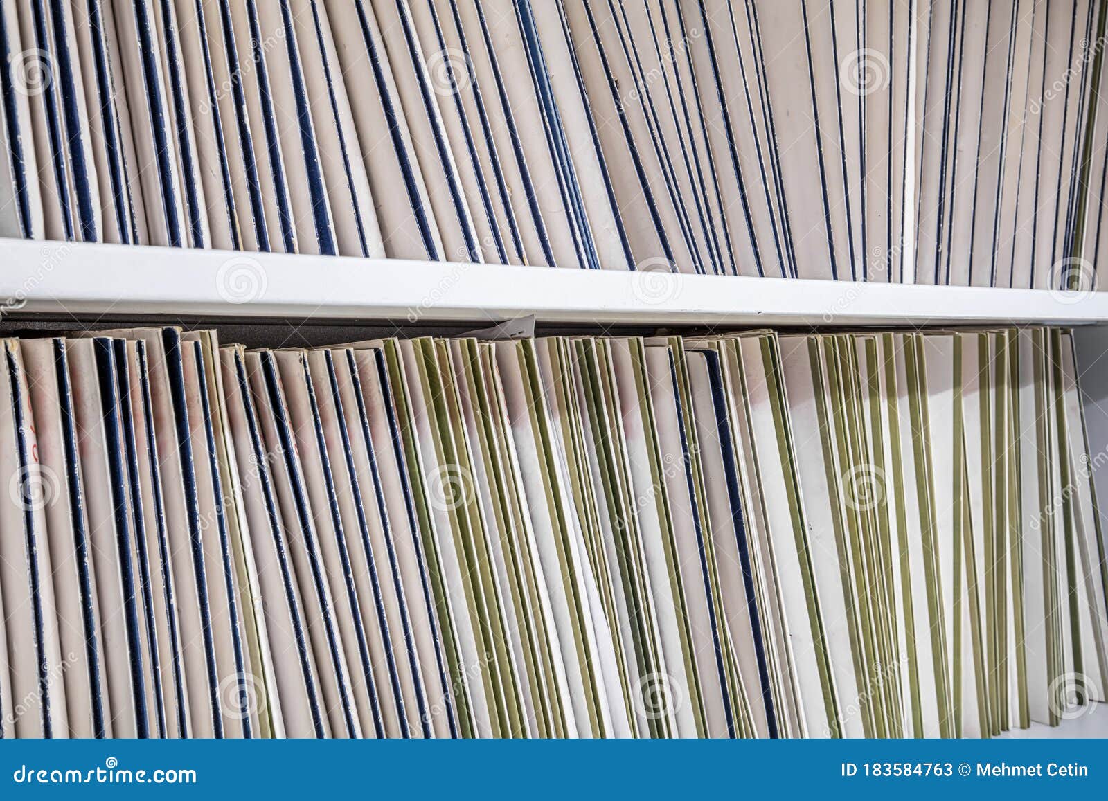 Rows of File Folders Arranged on Shelf with Client Data in Office ...