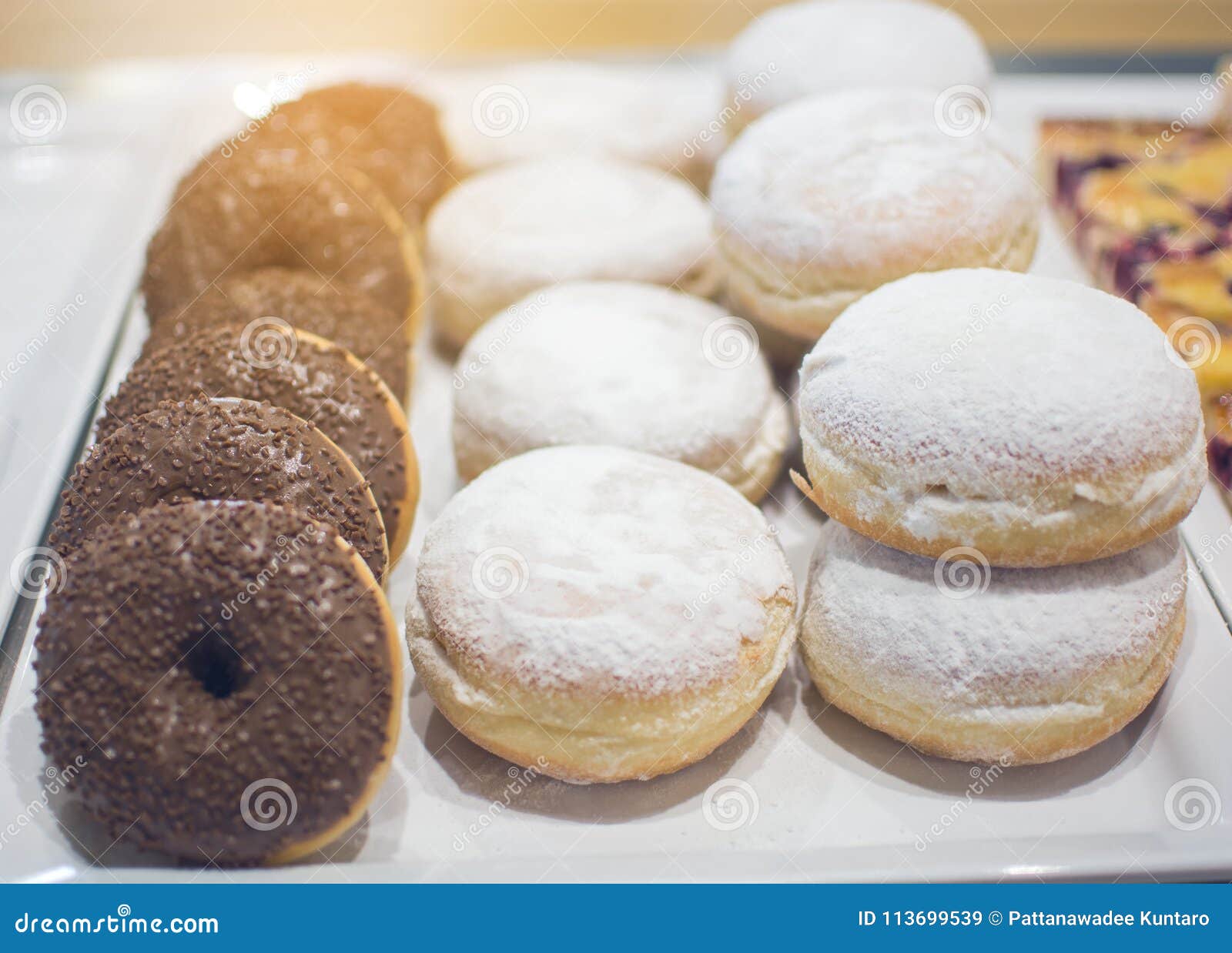 Rows of Fresh Donuts on the Plate Stock Image - Image of snack, dough ...