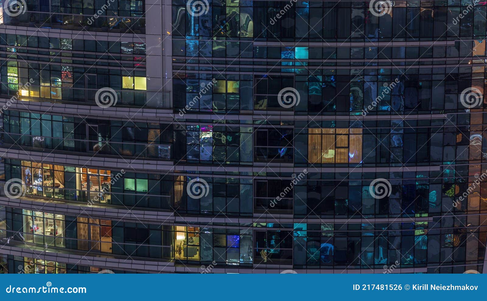Rows of Glowing Windows with People in Apartment Building at Night ...