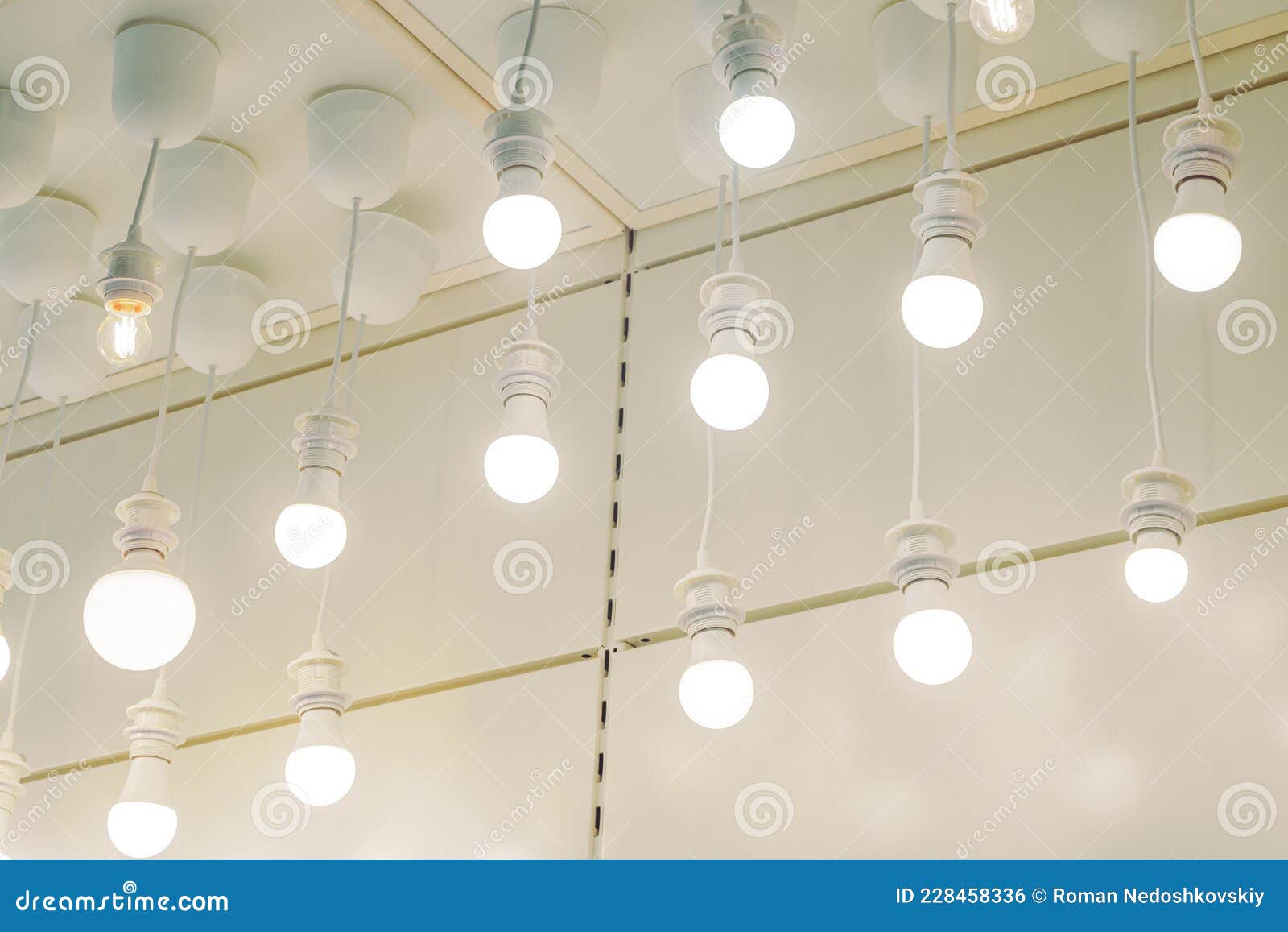 Rows of Hanged Led Glowing Light Bulbs Stock Photo - Image of glower ...