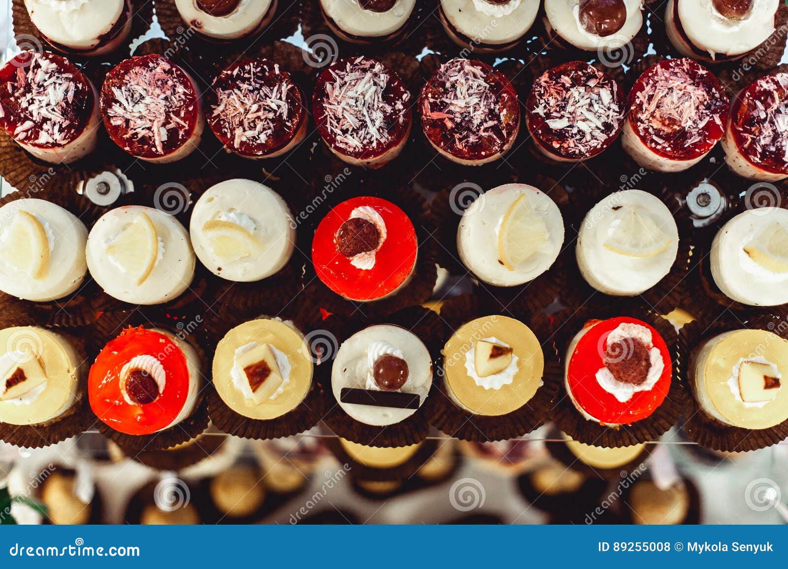 Rows of Italian Mignon Cakes on a Glass Stand Stock Photo - Image of ...