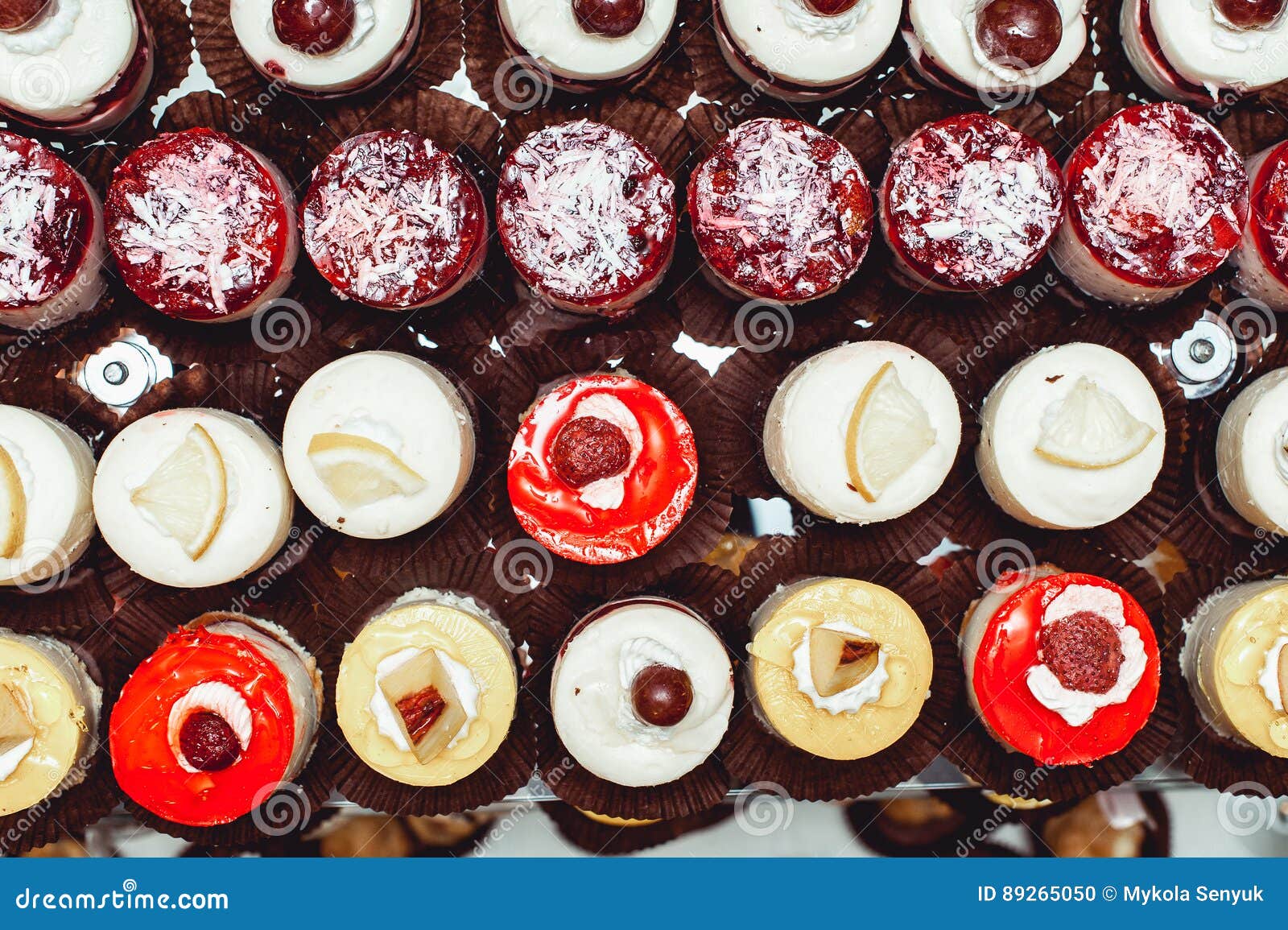 Rows of Italian Mignon Cakes on a Glass Stand Stock Photo - Image of ...