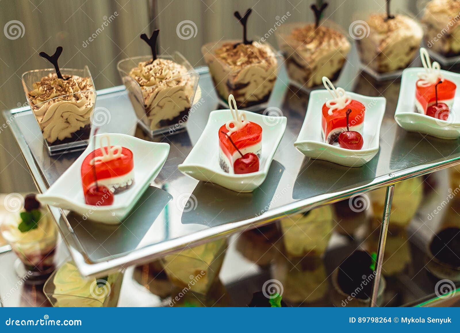 Rows of Italian Mignon Cakes on a Metal Stand Stock Photo - Image of ...