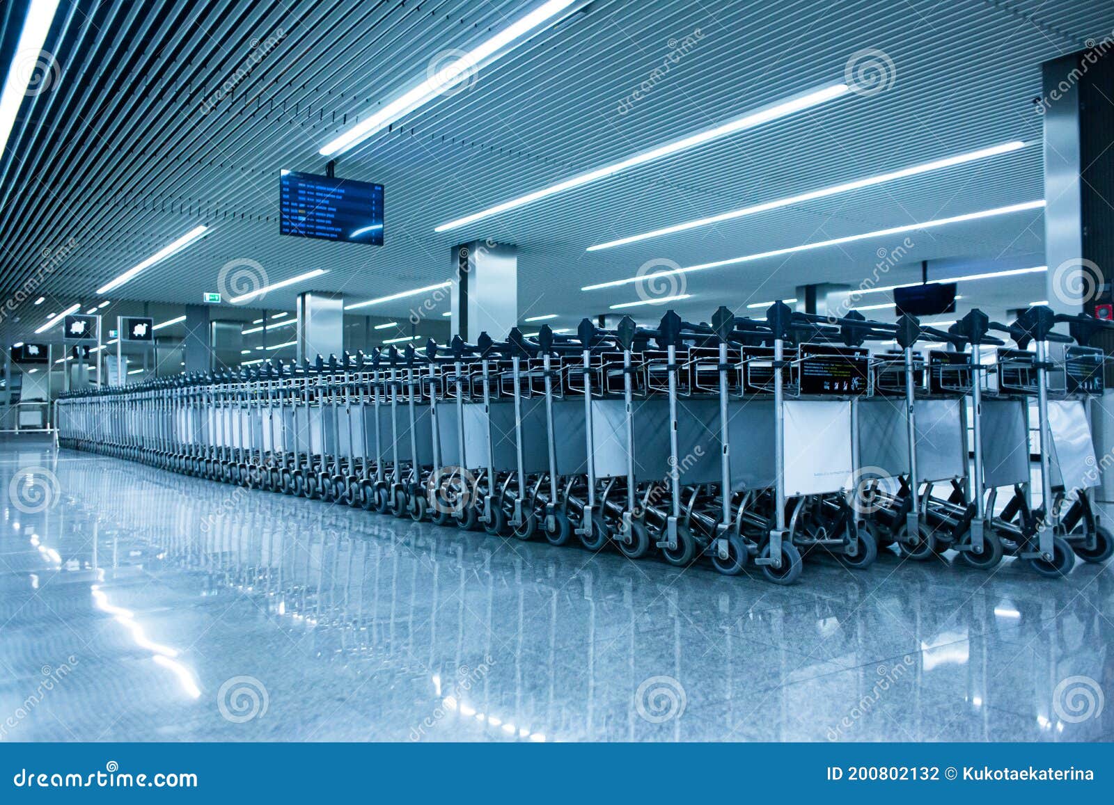 Rows of Luggage Baskets in the Airport Terminal. Empty Airport ...