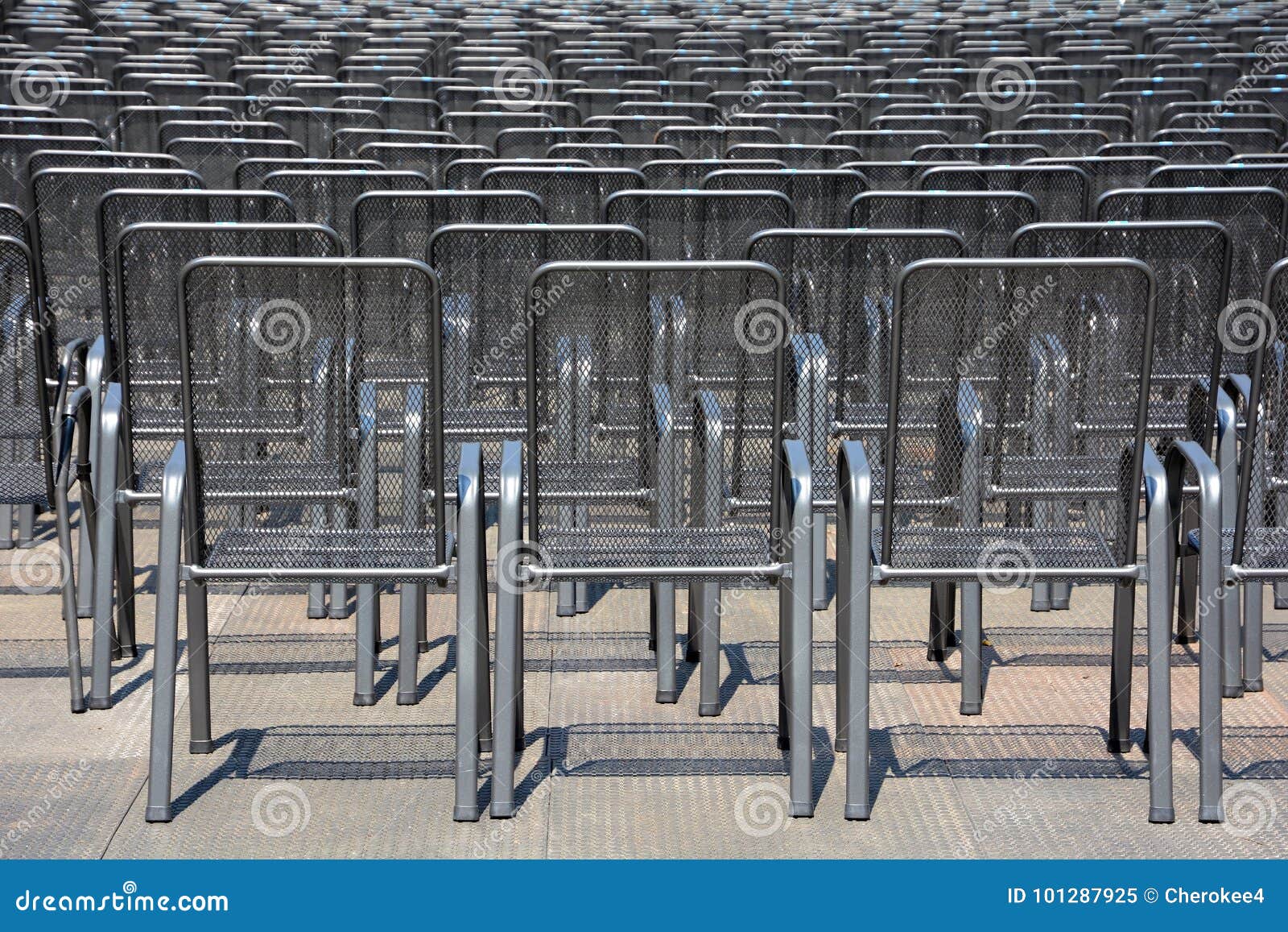 Rows of metal chairs. stock image. Image of street, stainless - 101287925