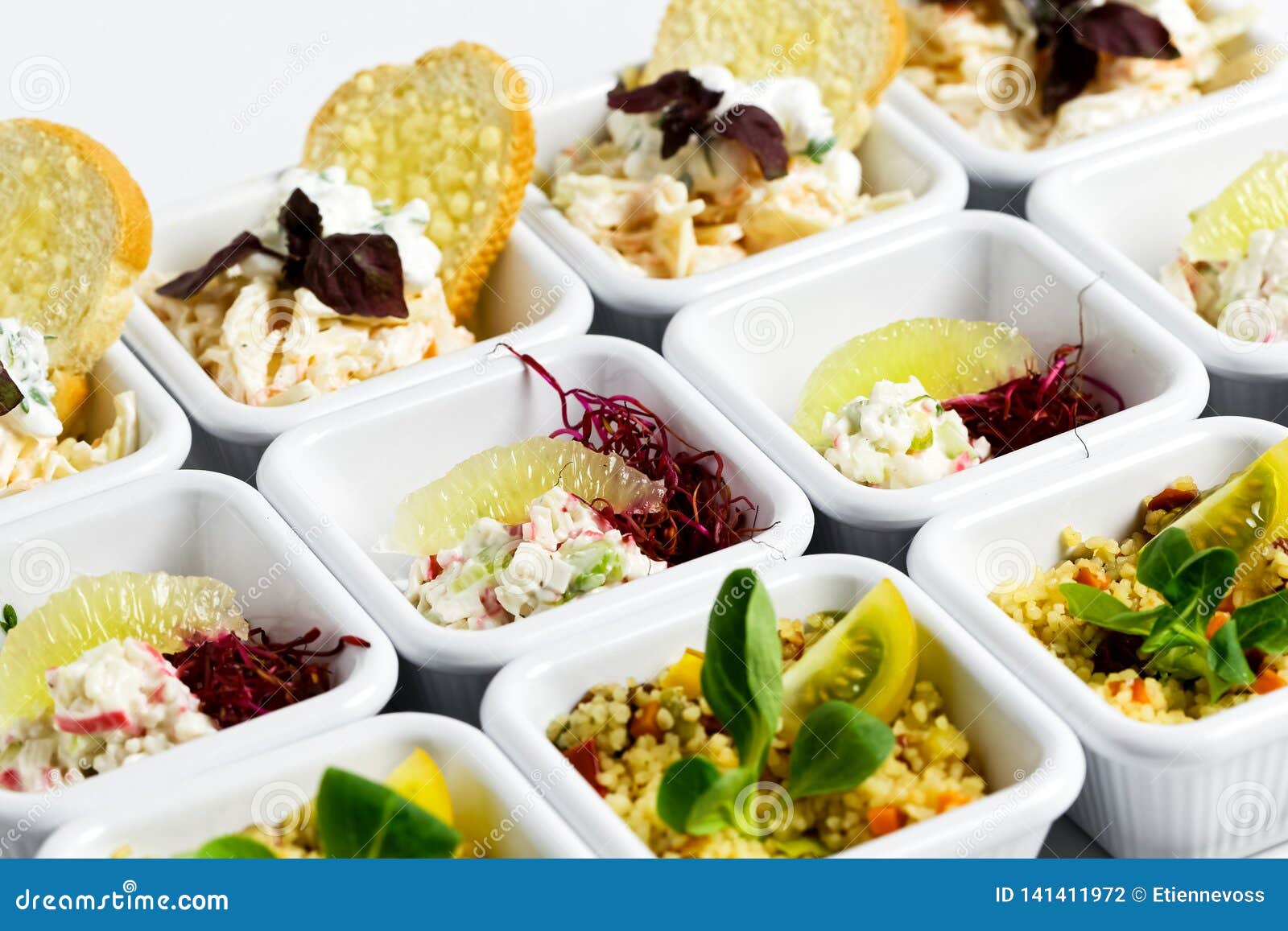 Rows of Mixed Canapes in White Square Ceramic Dishes Stock Photo ...